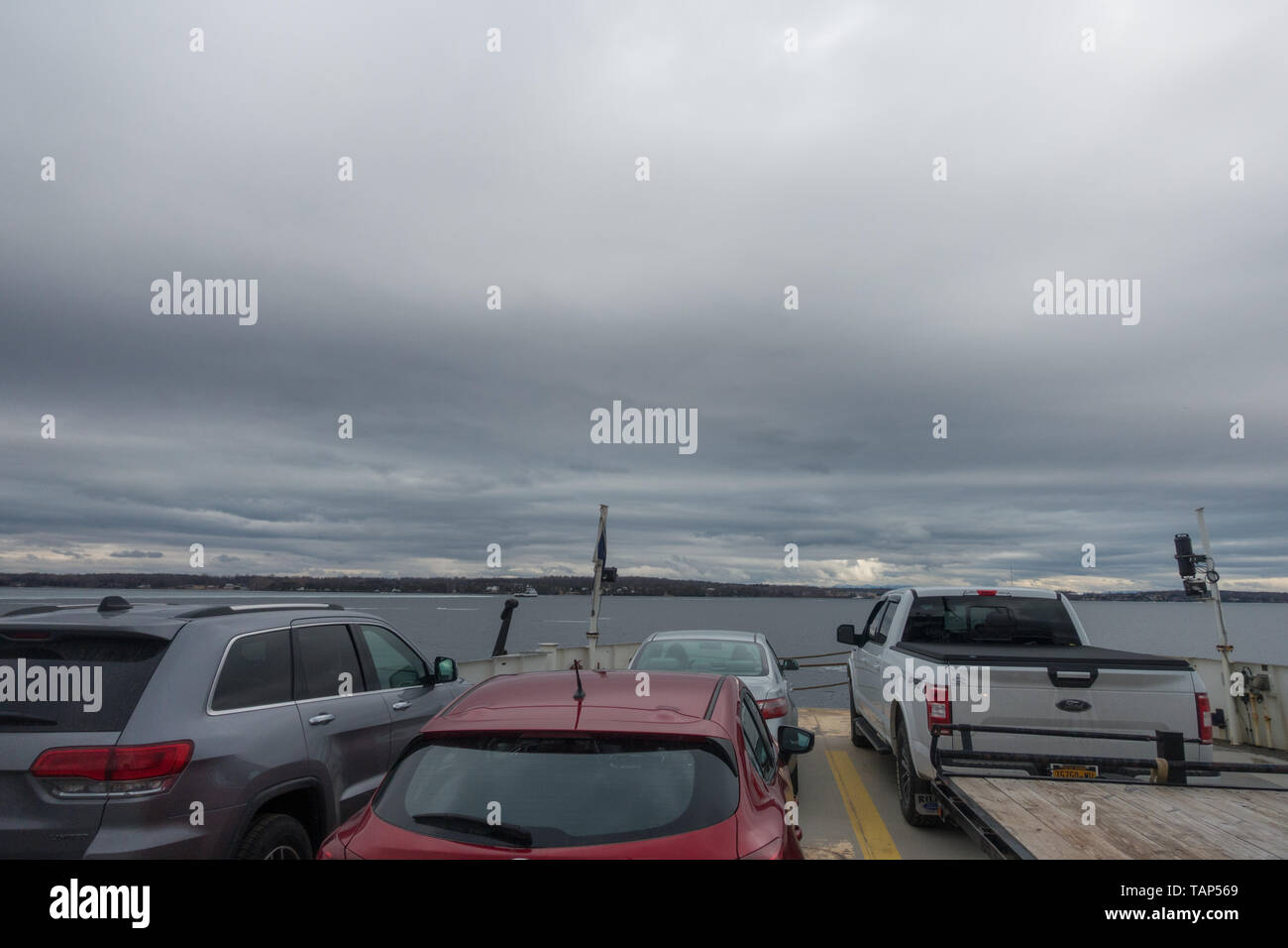 car ferry transporting vehicles across a body of water Stock Photo - Alamy