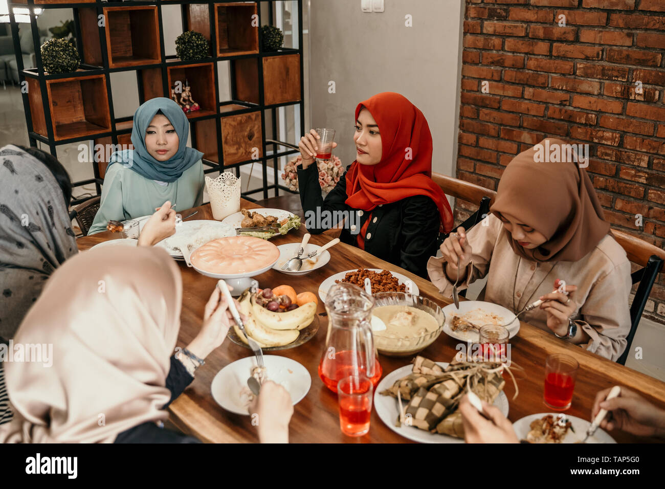 Family members when breaking fast together in the dining room Stock ...