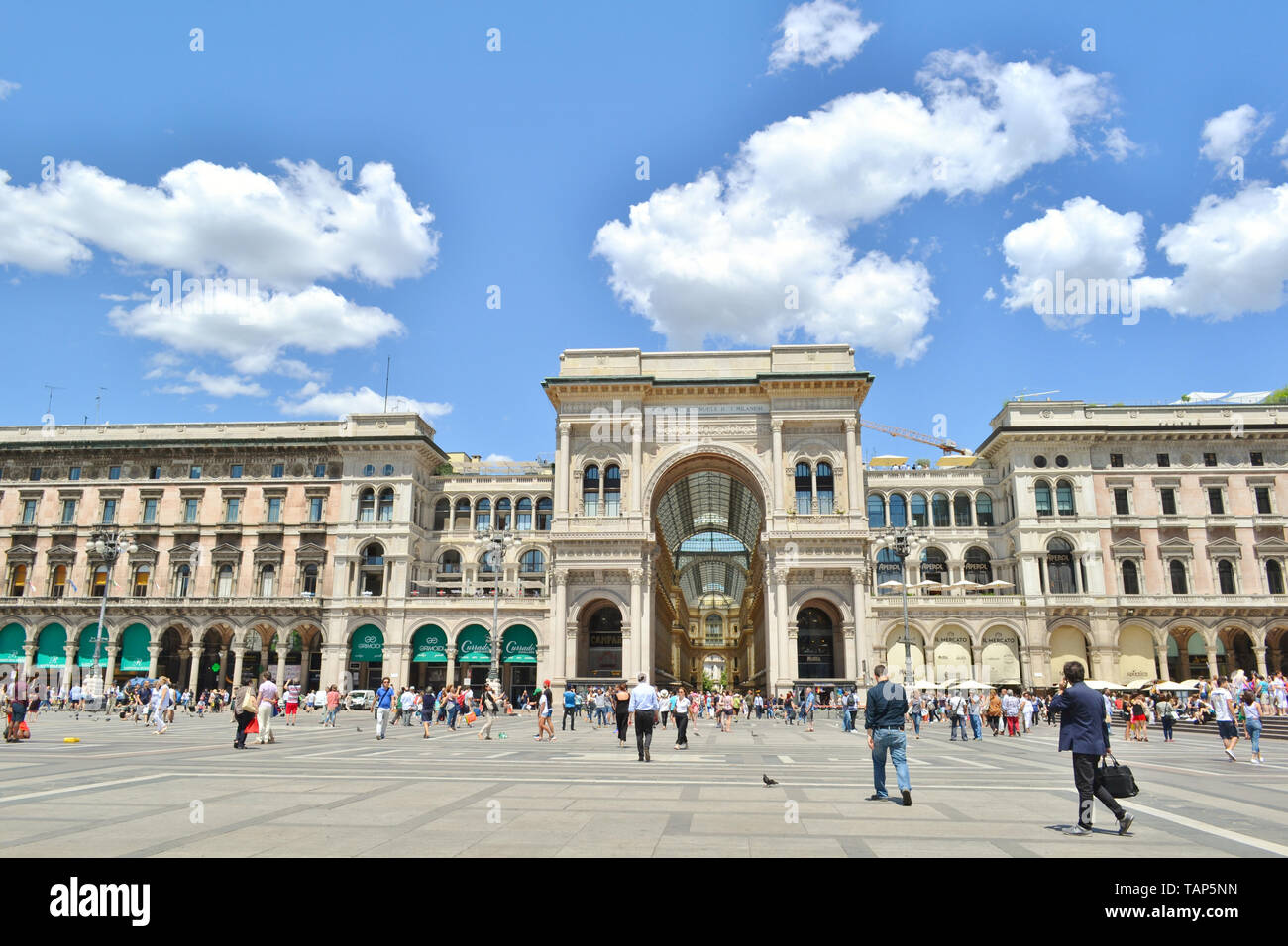 Milan, Italy - July 15, 2016: Busy people and tourists are walking at ...