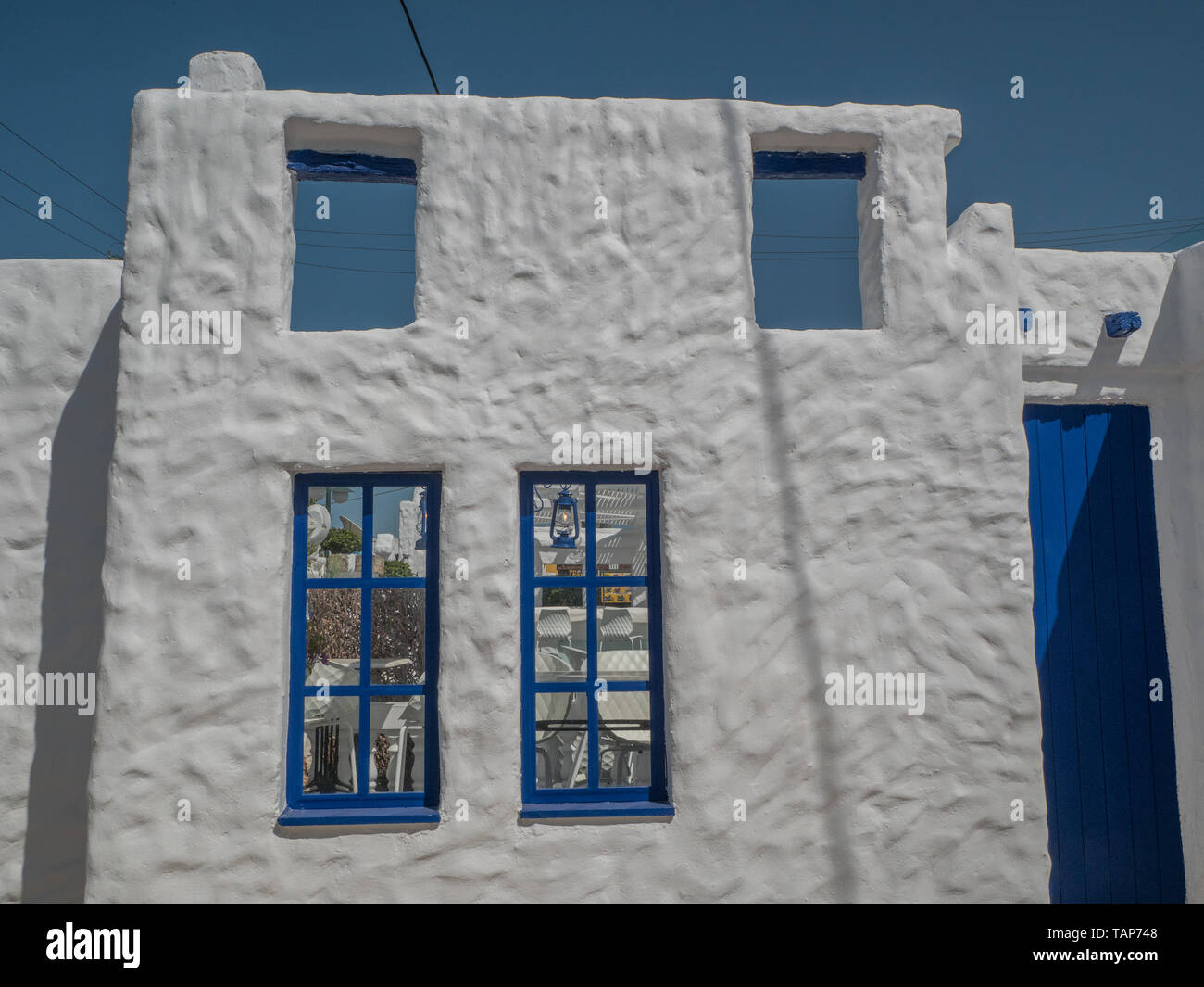 Santorini greek style decoration building blue windows Stock Photo - Alamy