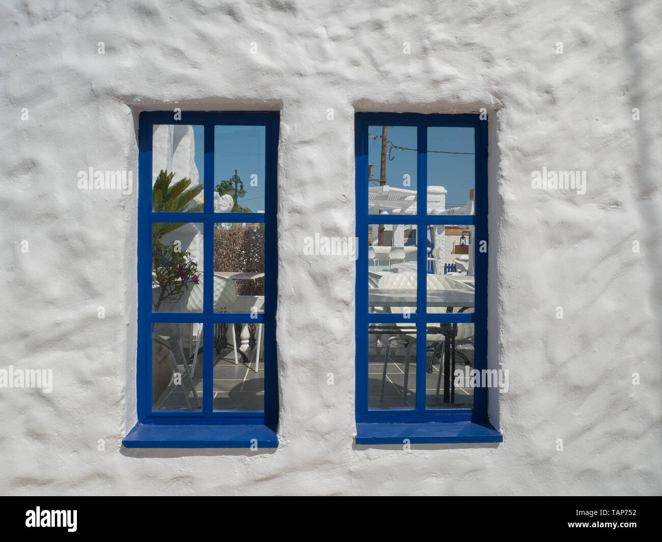 Santorini greek style decoration building blue windows Stock Photo - Alamy
