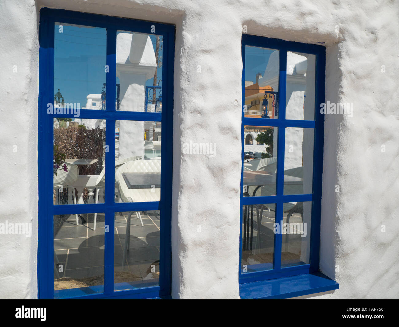 Santorini greek style decoration building blue windows Stock Photo - Alamy