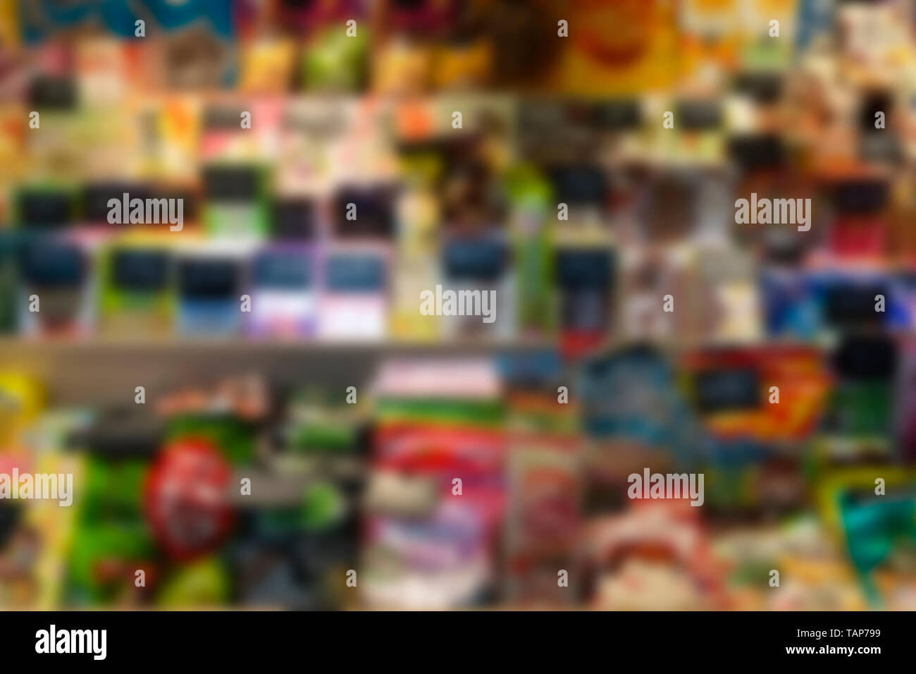 Blur supermarket background. Showcase with food (sweets, fruits, snacks ...