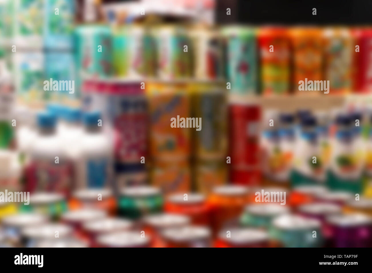 Blur supermarket background. Showcase with food (sweets, fruits, snacks ...