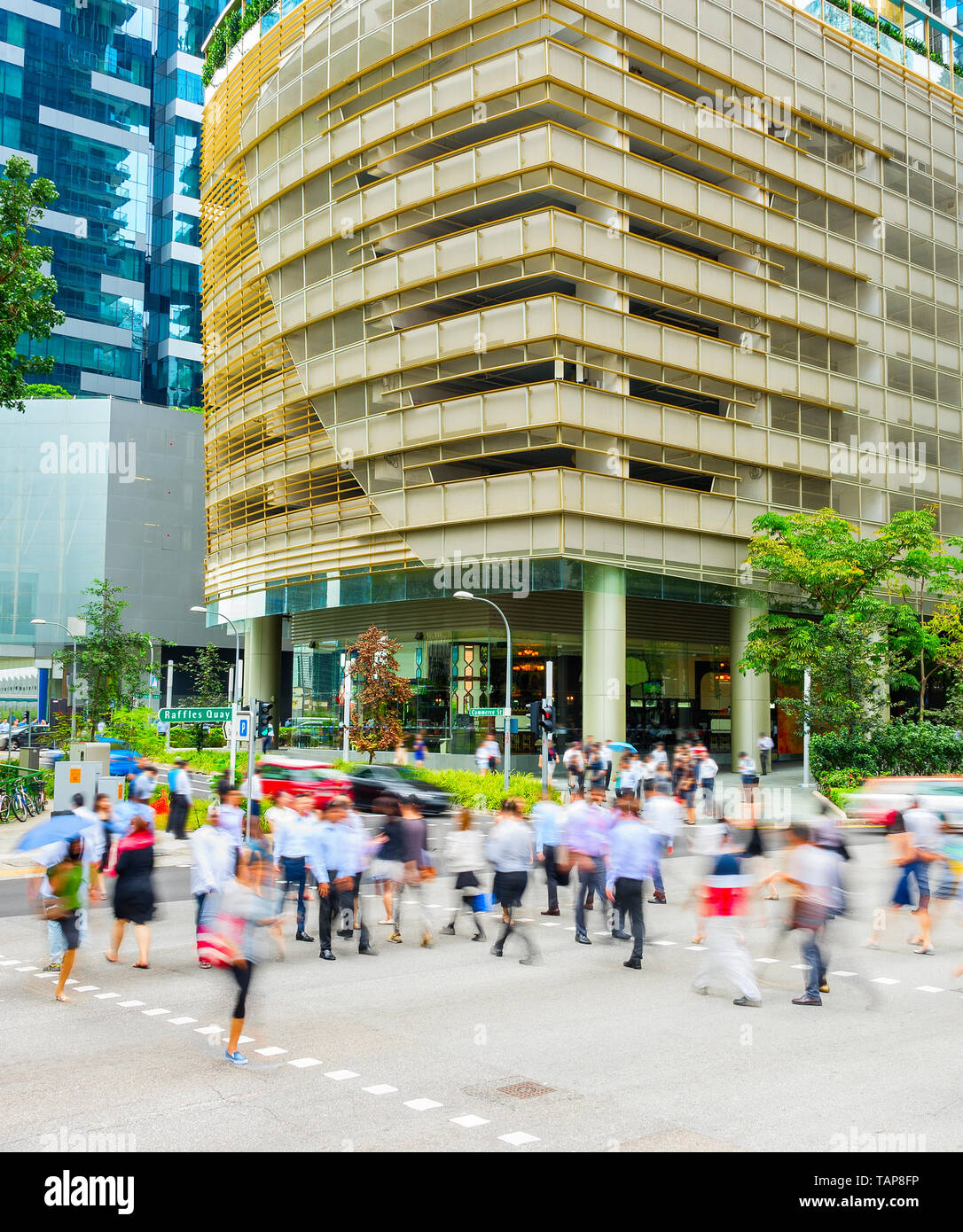 crowd of business people at the crossroad by the office buildings in ...