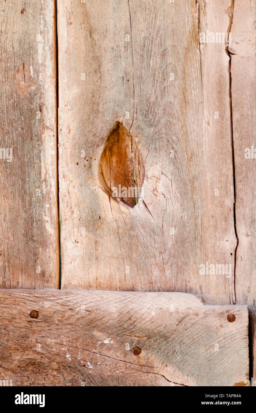 Detail embossed metal handle and an old door Stock Photo - Alamy