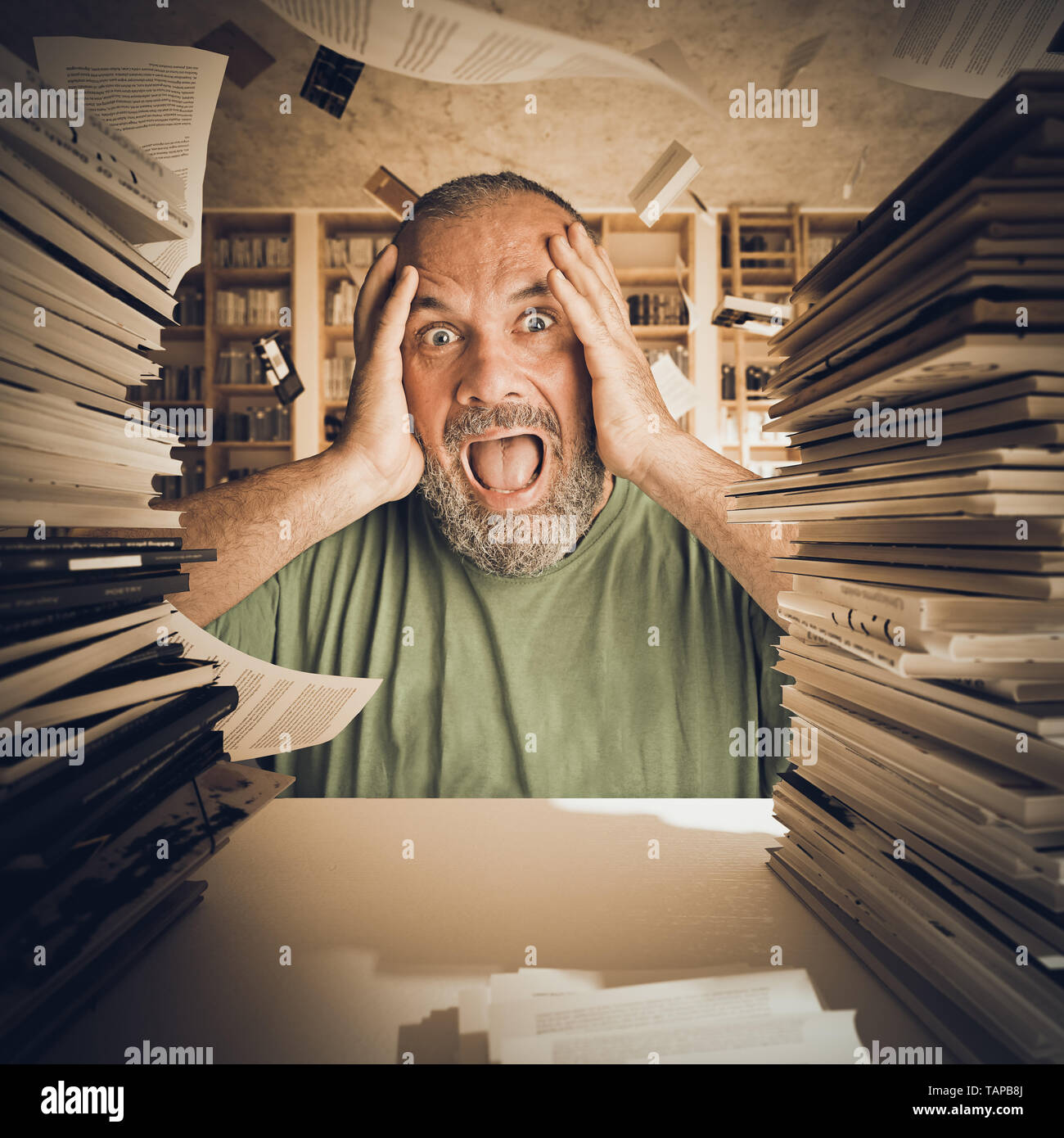 Stressed student reading book hi-res stock photography and images - Alamy