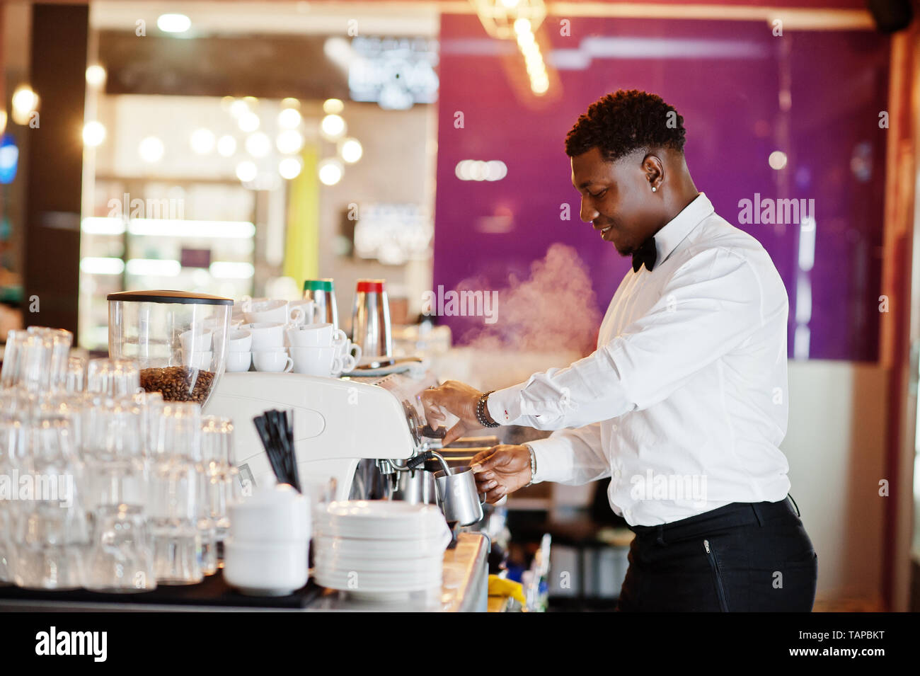 African american bartender barista at bar preparing coffee Stock Photo ...