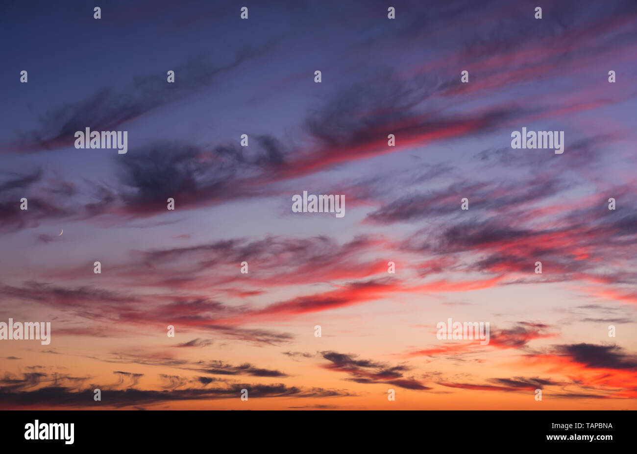 Dramatic sunset sky with colored clouds. Toned image Stock Photo - Alamy