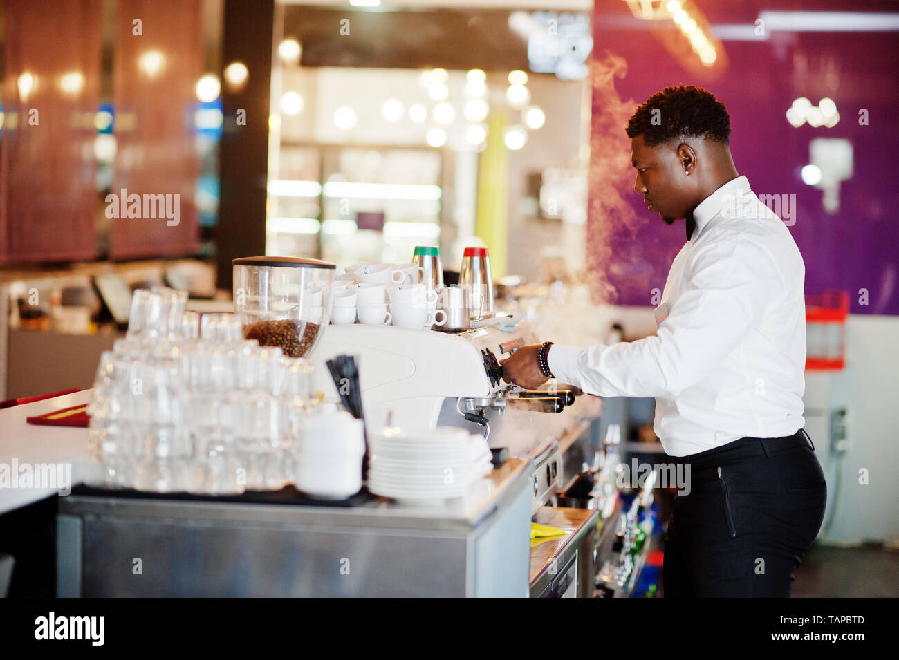 Happy african american barman preparing hi-res stock photography and ...