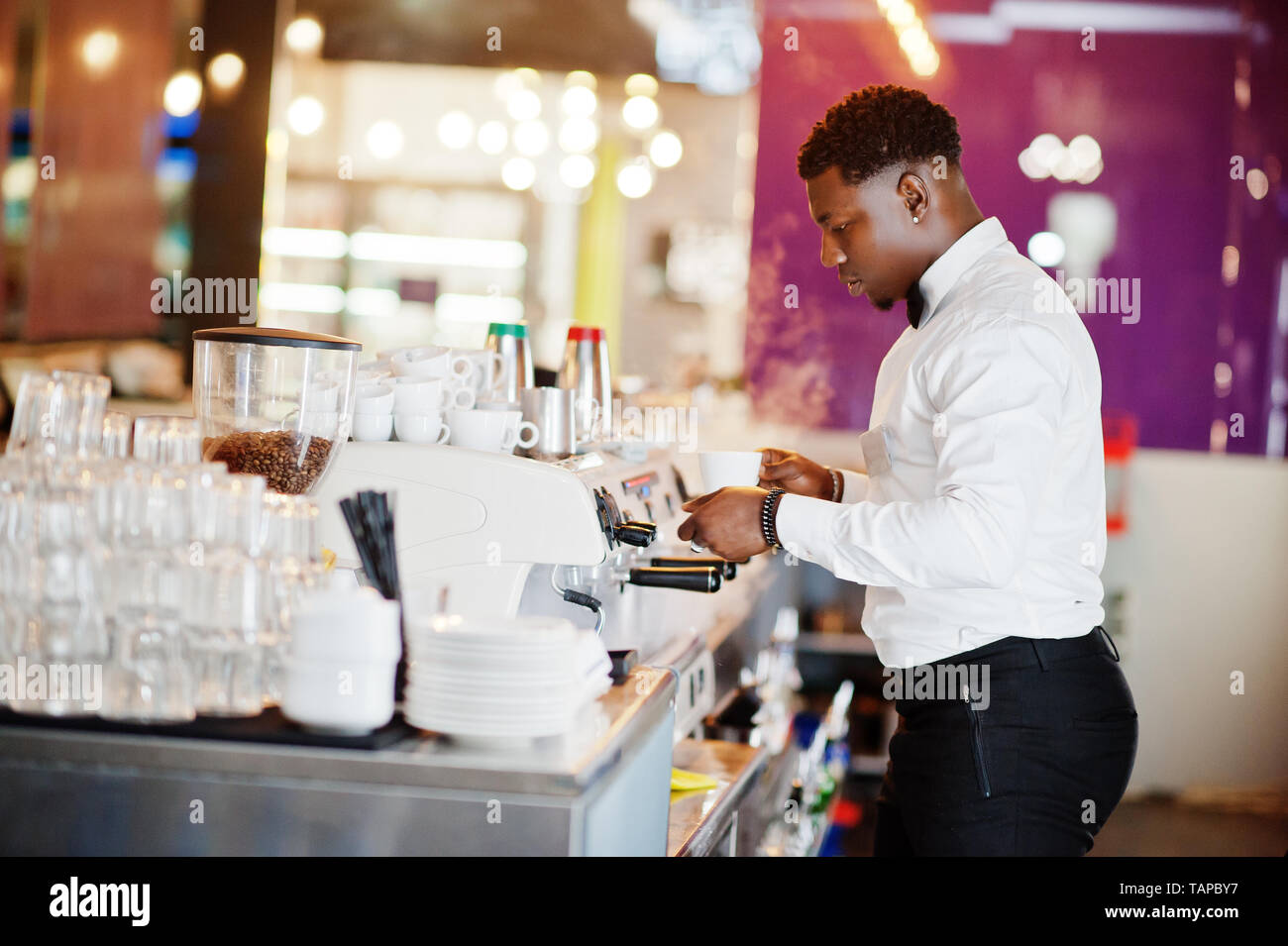 Black african bartender hi-res stock photography and images - Alamy