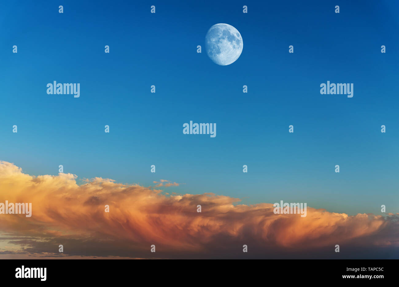 Moon with sunset sky background Stock Photo - Alamy