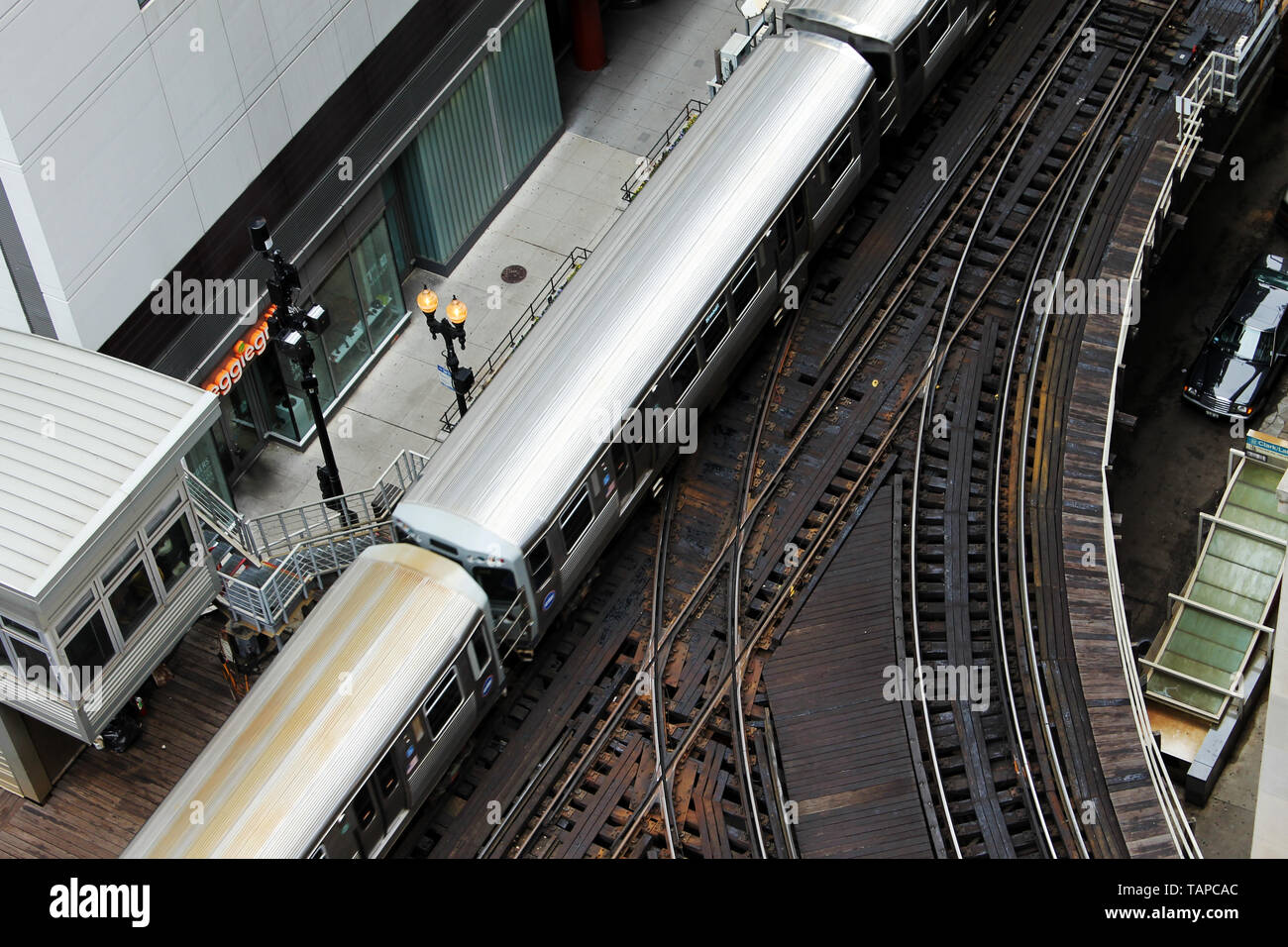 Chicago L train cars from the CTA on elevated tracks in the Loop ...