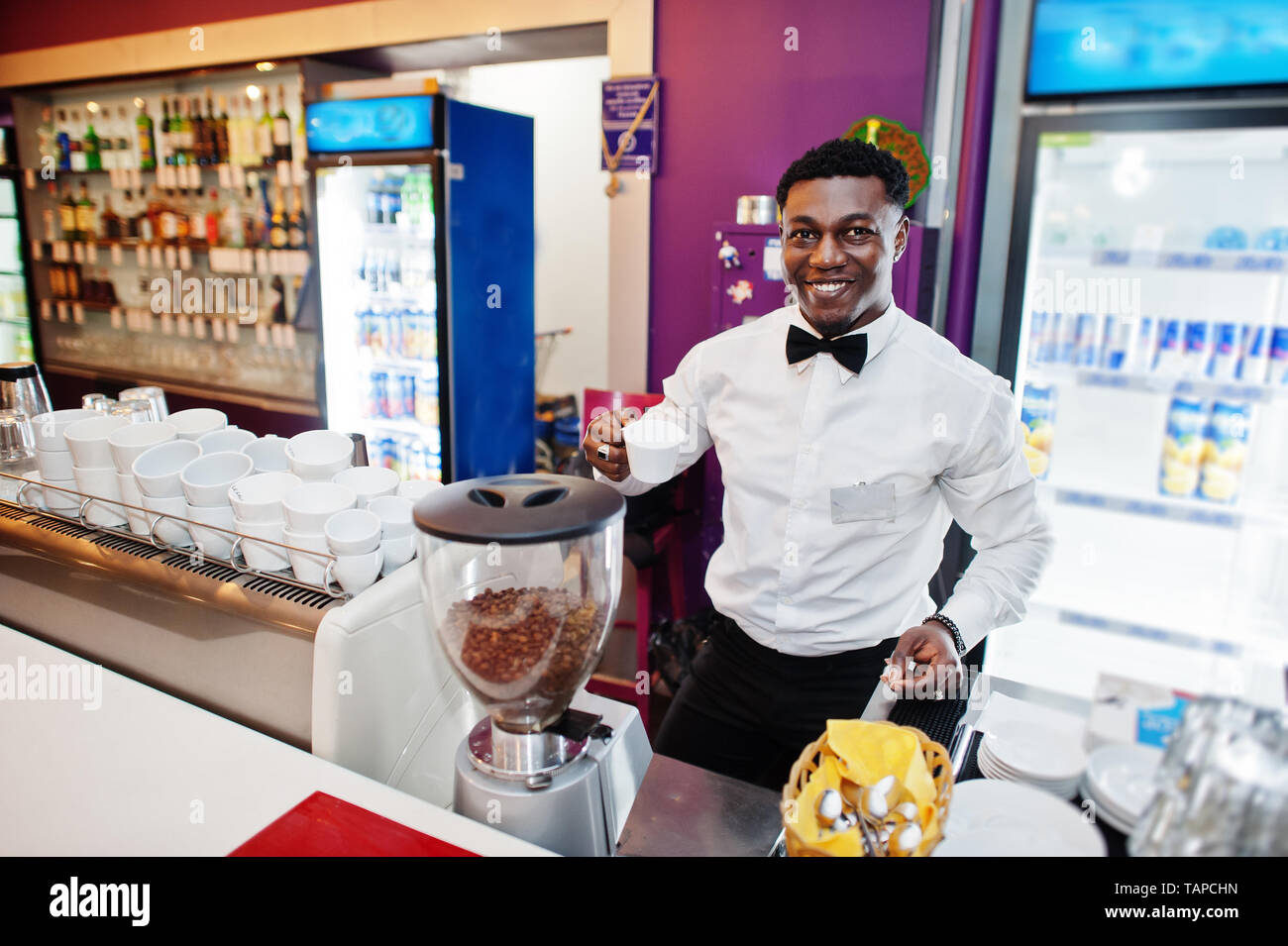 Happy african american barman preparing hi-res stock photography and ...