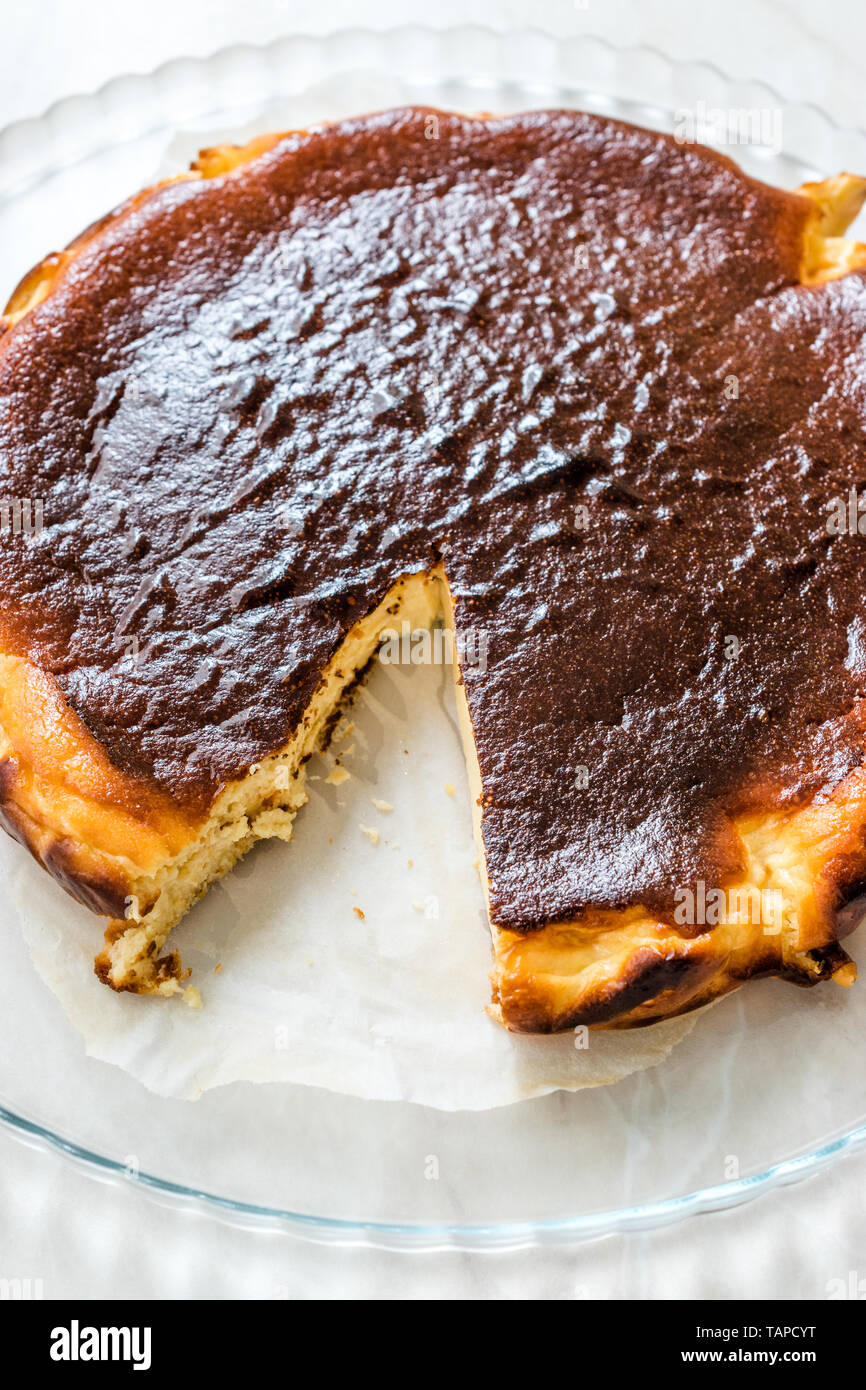San Sebastian Cheesecake on Wooden surface / Creamy Plain New York ...