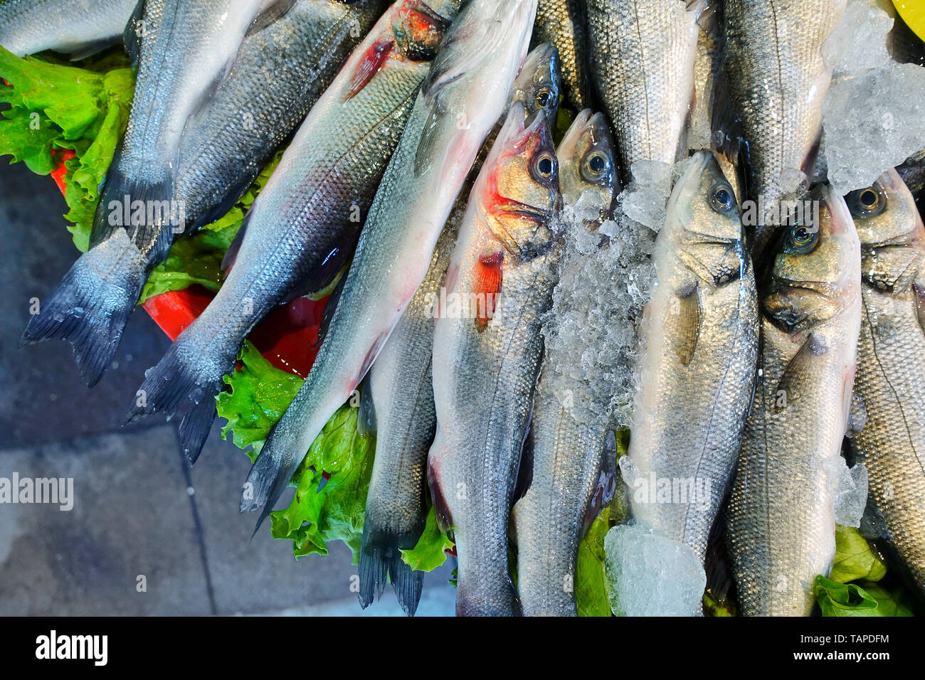 Raw Fish Food in a Fish Market Stand Stock Photo - Alamy