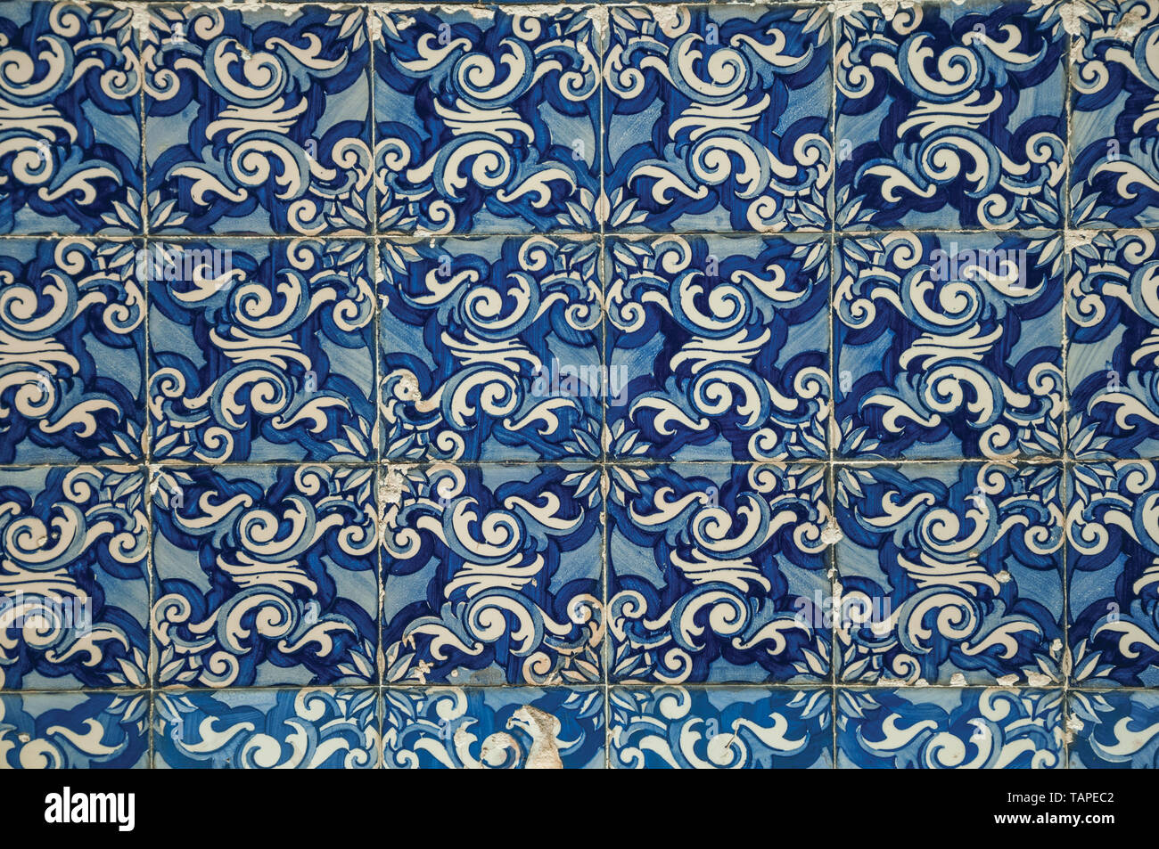 Blue floral pattern hand-painted in baroque style on ceramic tiles in ...