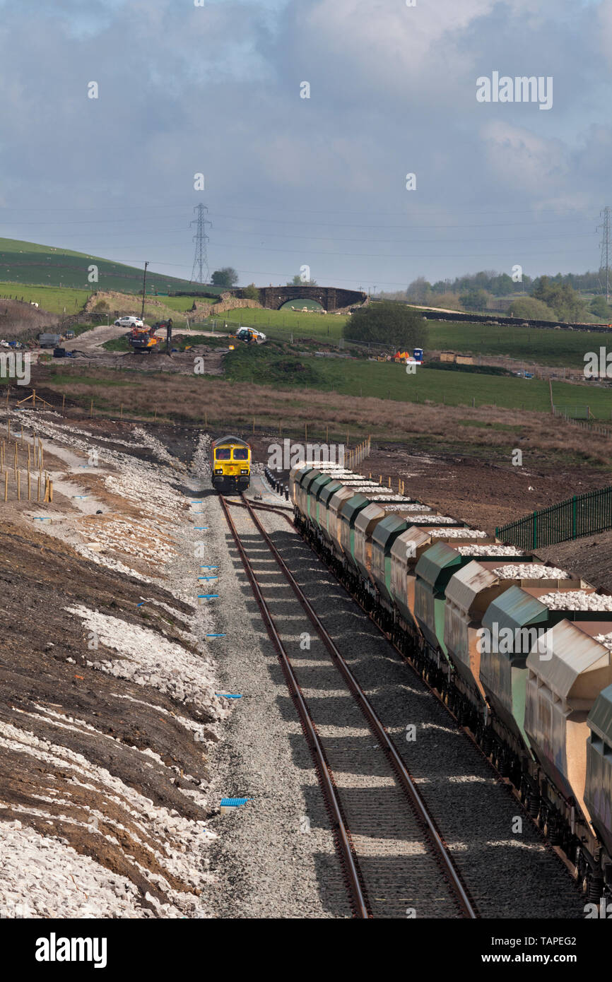 Freightliner class 66 locomotive running round its train at the ...