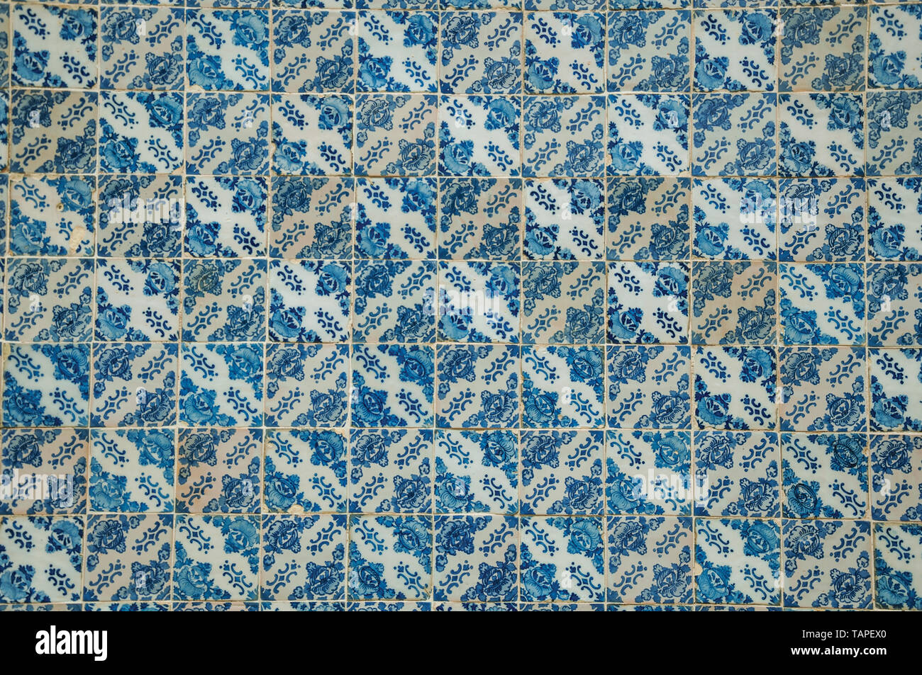 Blue floral pattern hand-painted in baroque style on ceramic tiles in ...