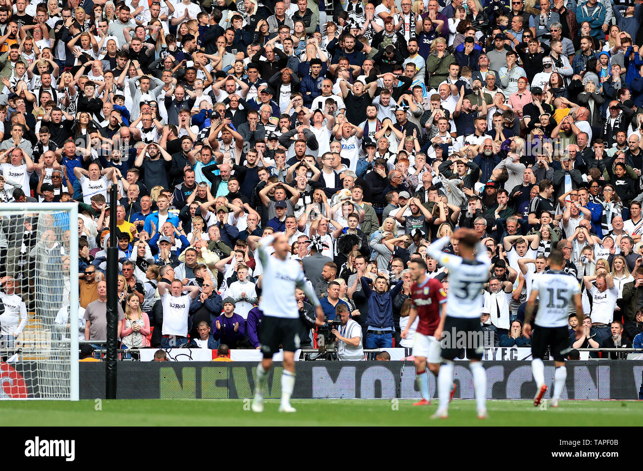 Derby County fans appear dejected during the Sky Bet Championship Play ...