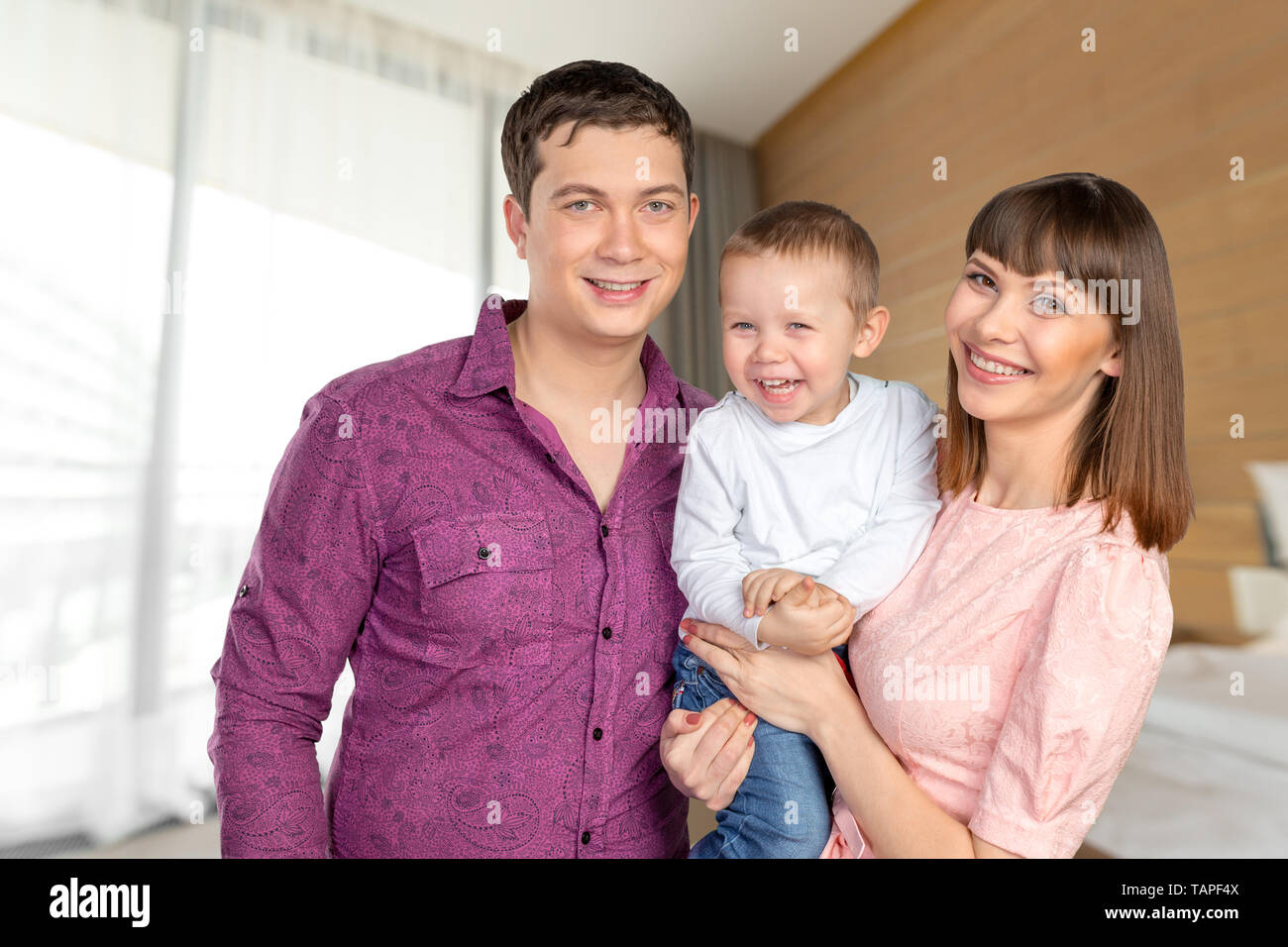 Beautiful happy family Stock Photo - Alamy