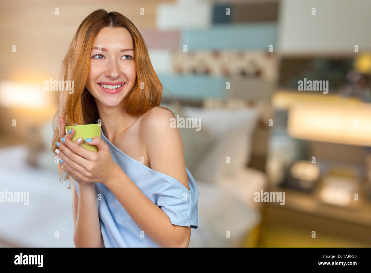 Beautiful girl with a cup Stock Photo - Alamy