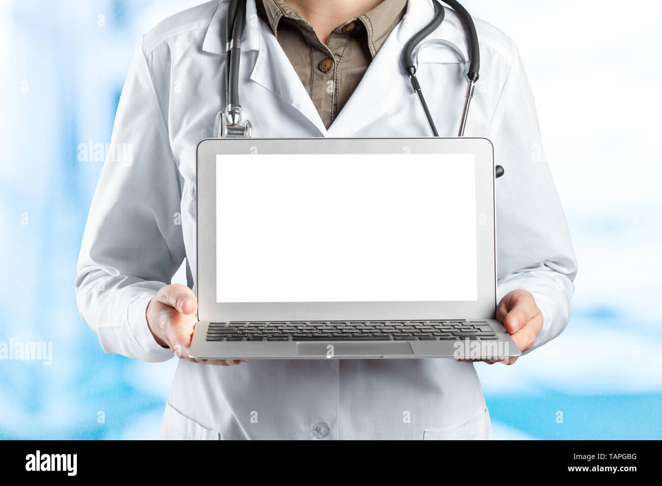 Doctors using laptop at work Stock Photo - Alamy