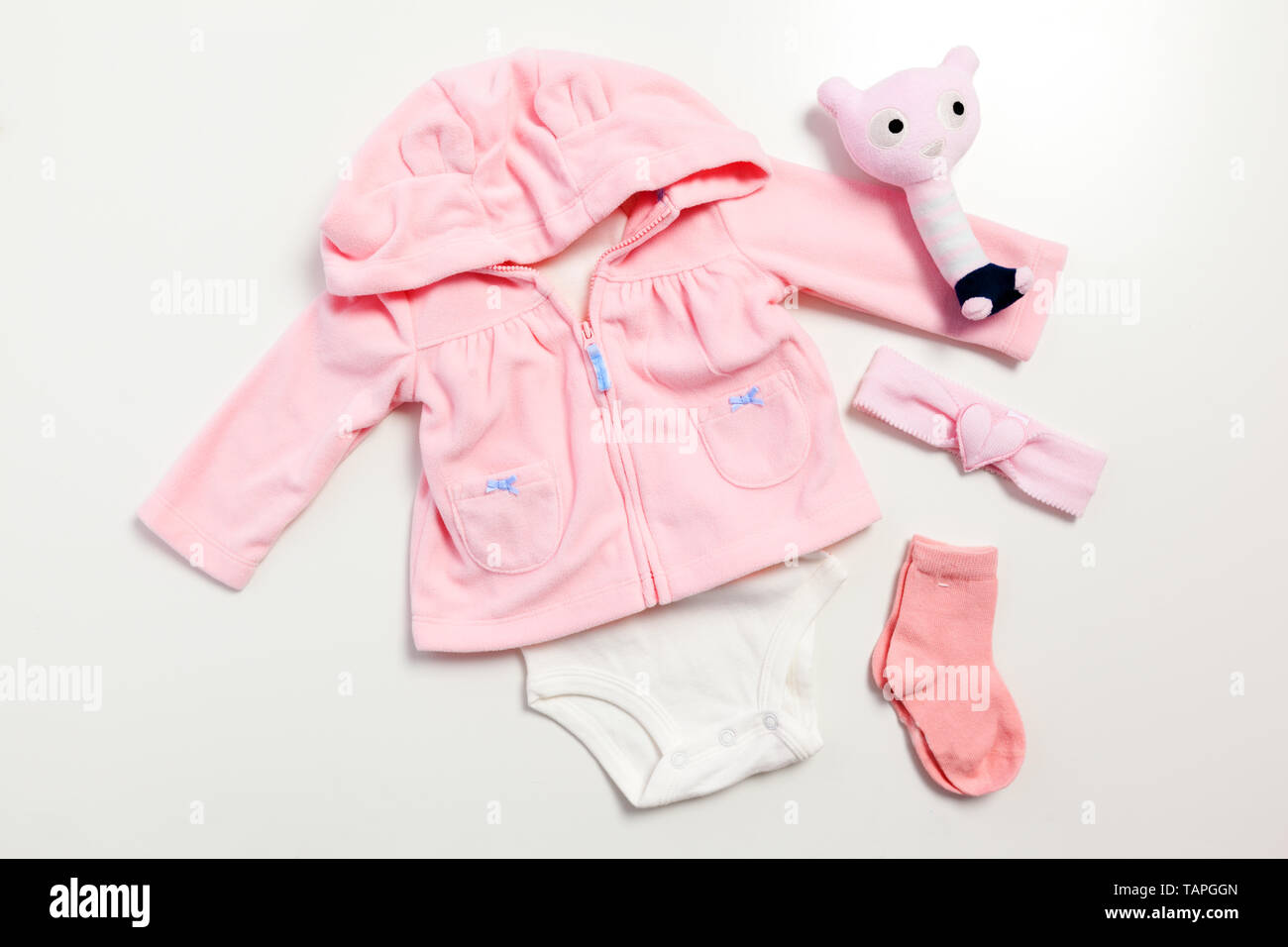 Set of clothing and items for a baby Stock Photo - Alamy