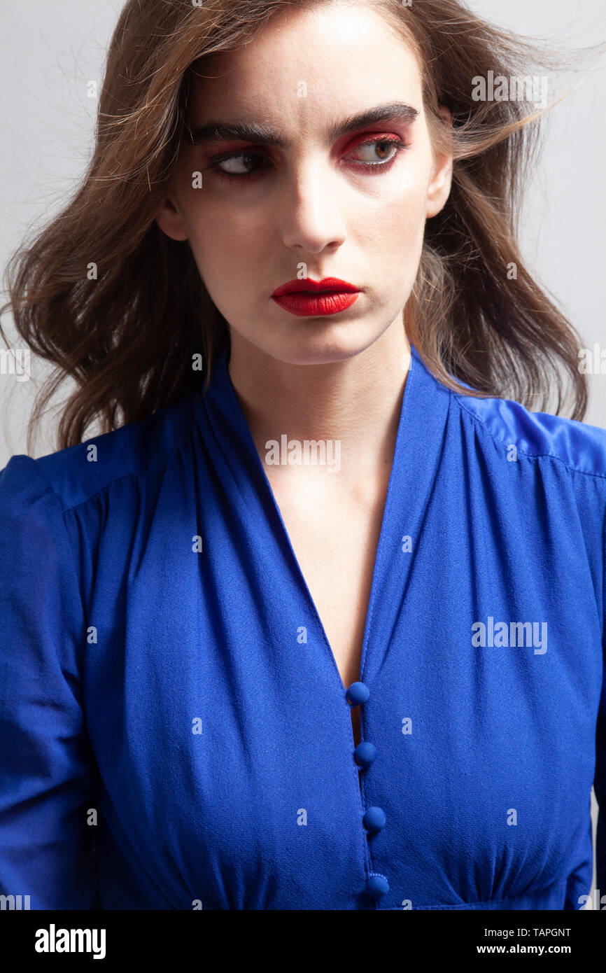 Woman in Blue Dress Stock Photo - Alamy