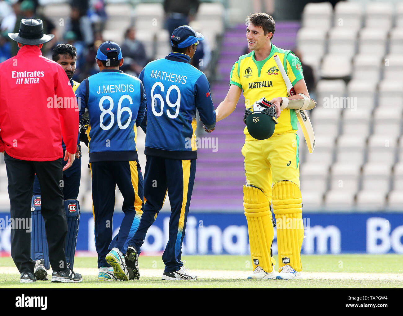 Australia's Pat Cummins shakes hands with Sri Lanka's Angelo Mathews at ...