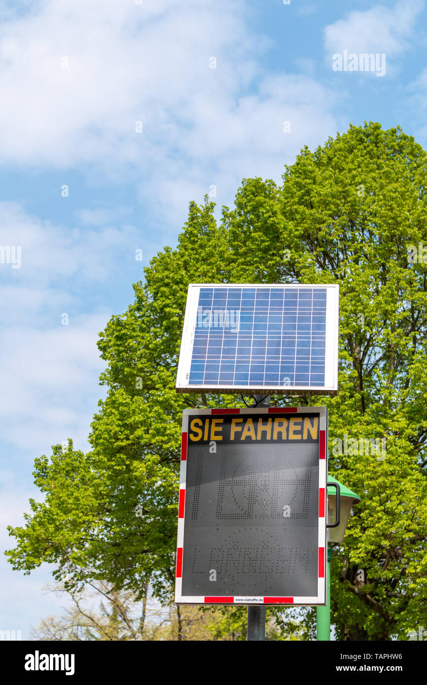 Radar speed sign with solar panel, Germany Stock Photo - Alamy