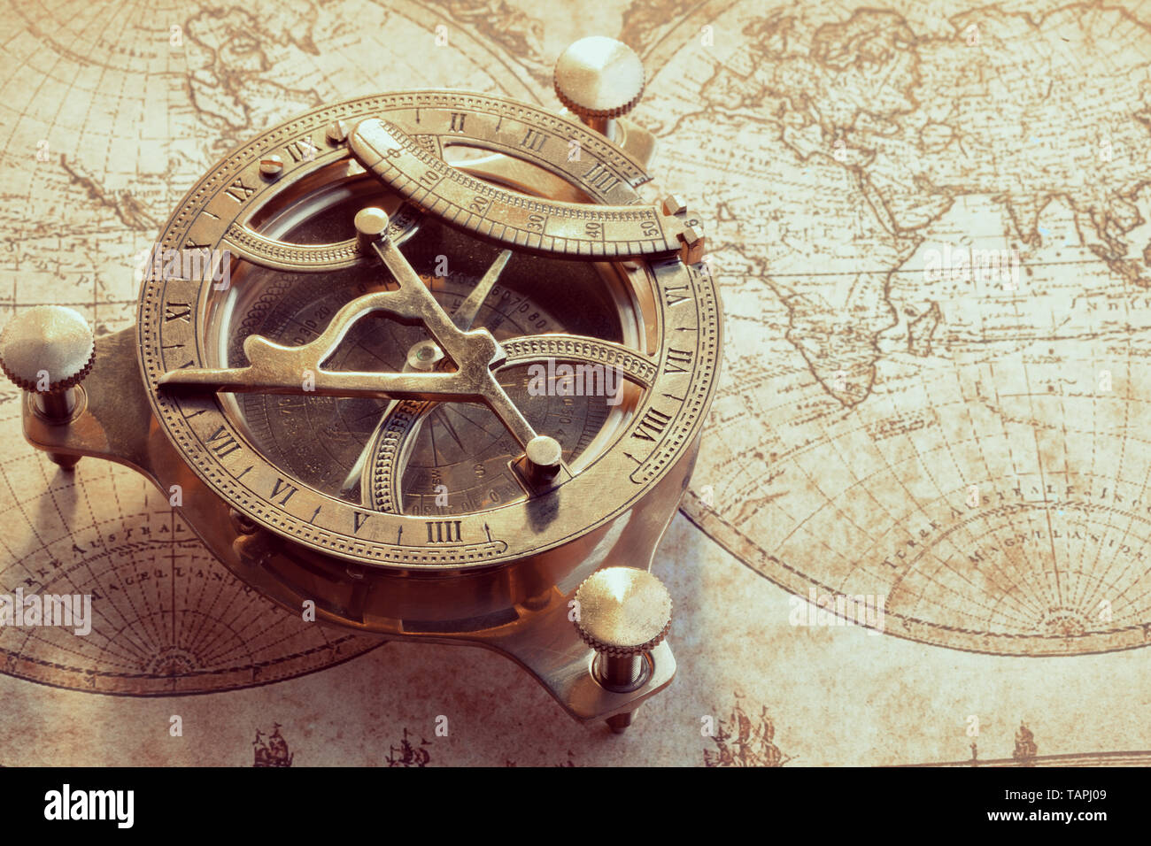 Old compass over ancient map Stock Photo - Alamy