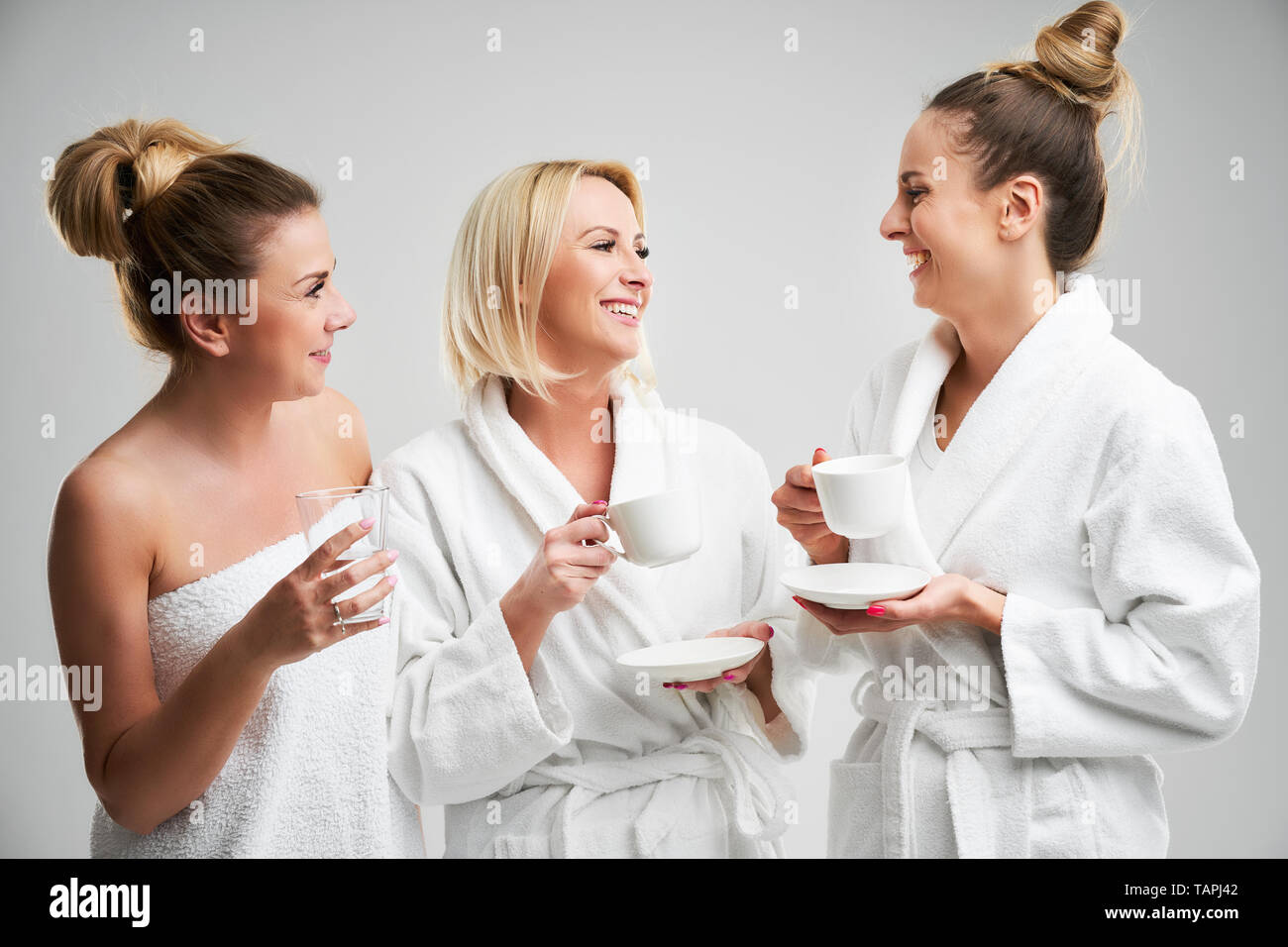 Group of happy friends in spa Stock Photo - Alamy