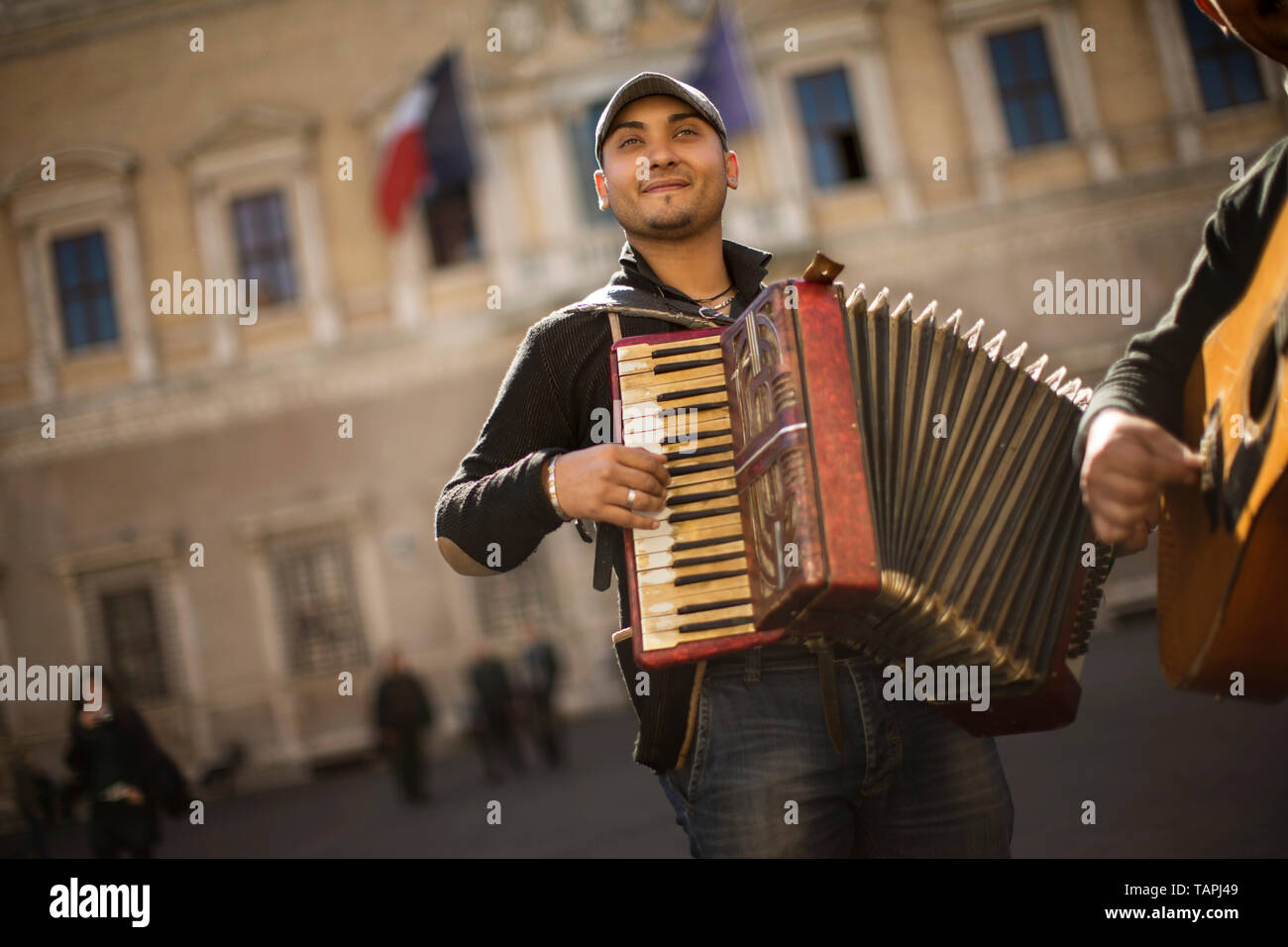 Street musicians performing in a town square Stock Photo - Alamy
