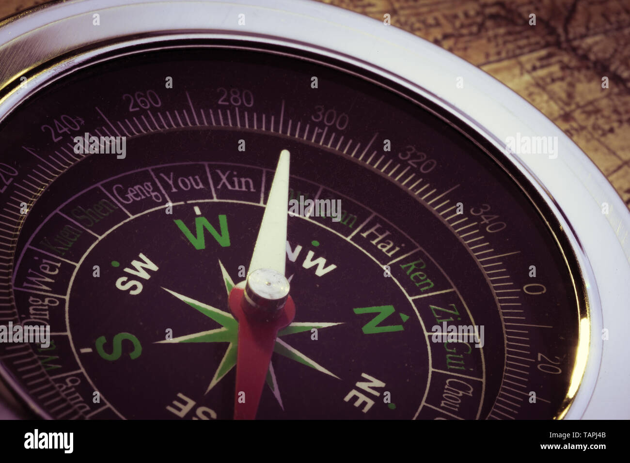 Old compass on vintage map Stock Photo - Alamy