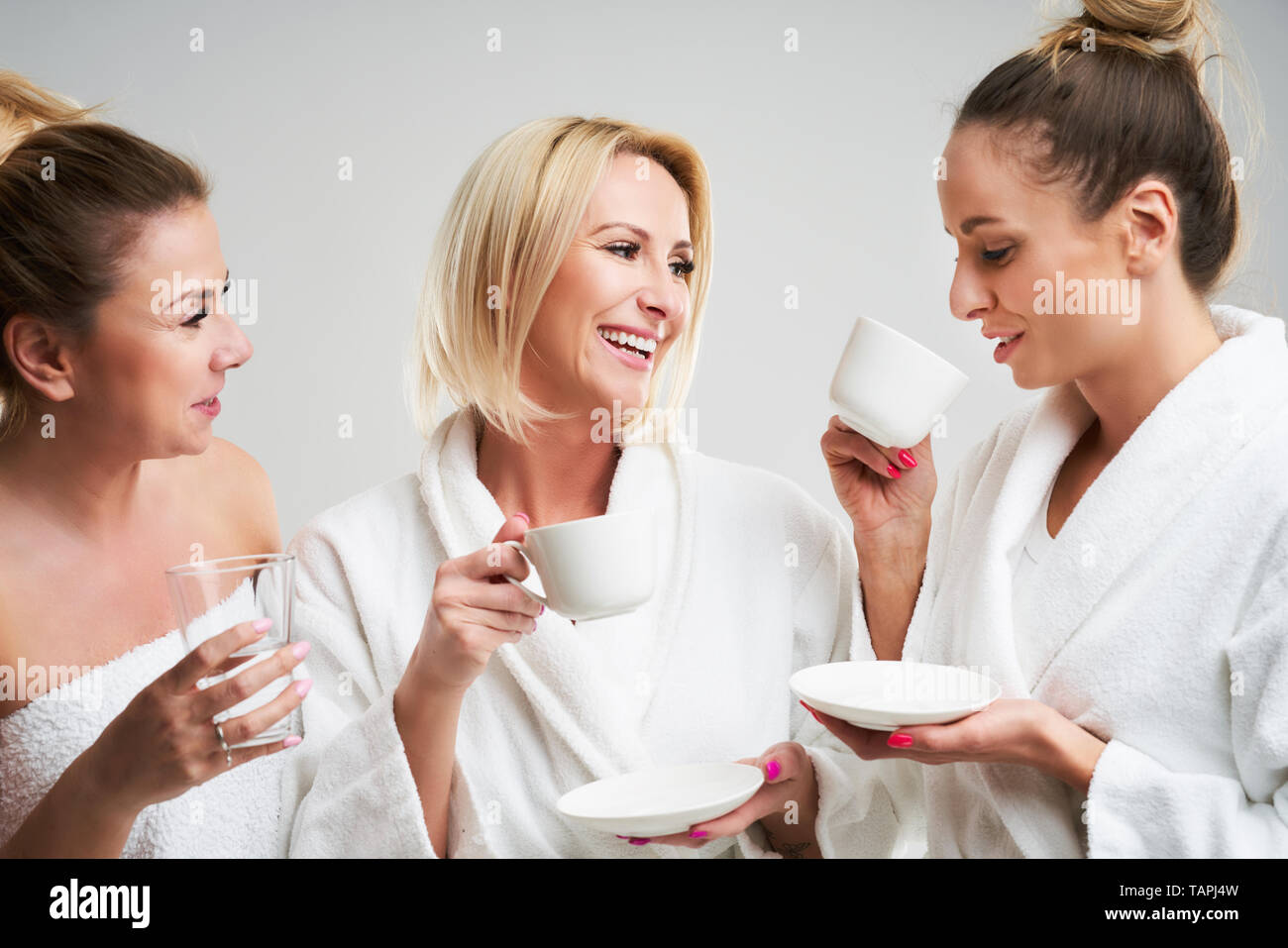 Group of happy friends in spa Stock Photo - Alamy