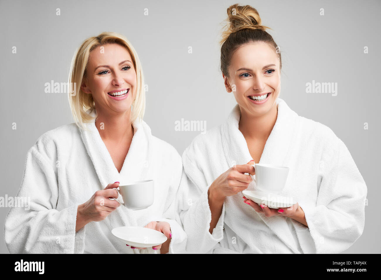 Group of happy friends in spa Stock Photo - Alamy