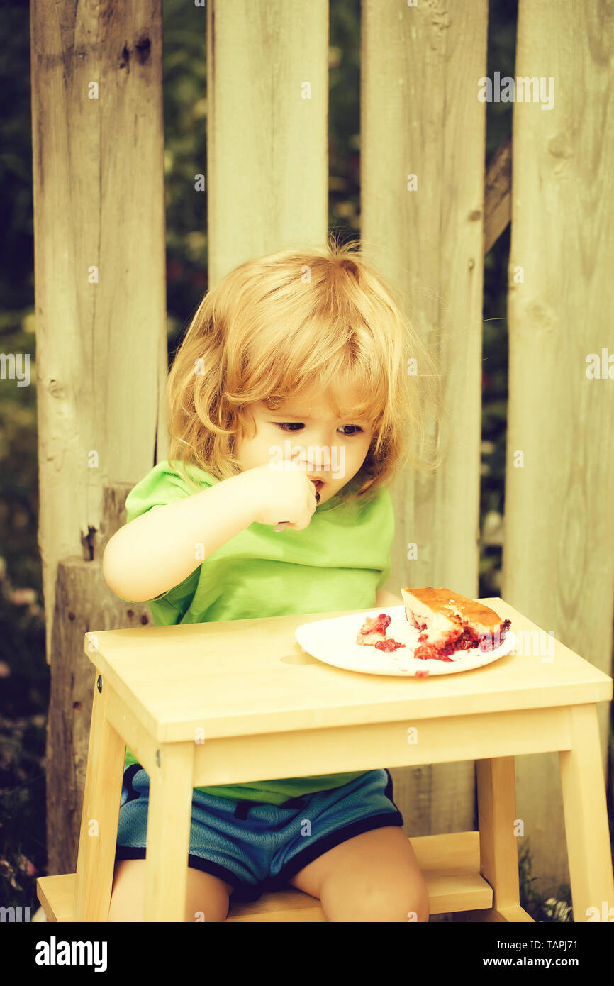 Boy eating pie hi-res stock photography and images - Alamy