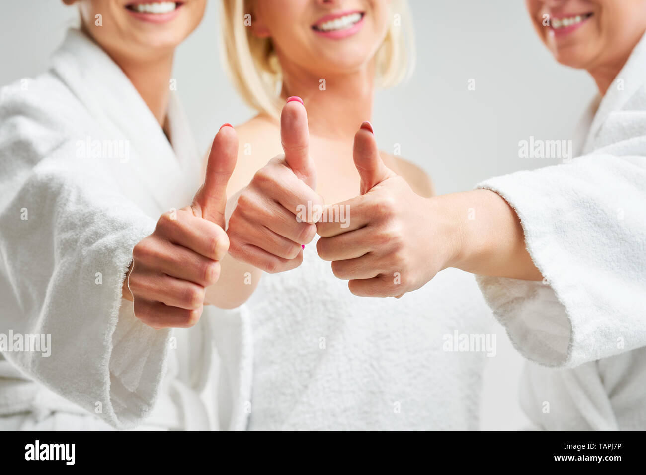 Group of happy friends in spa Stock Photo - Alamy
