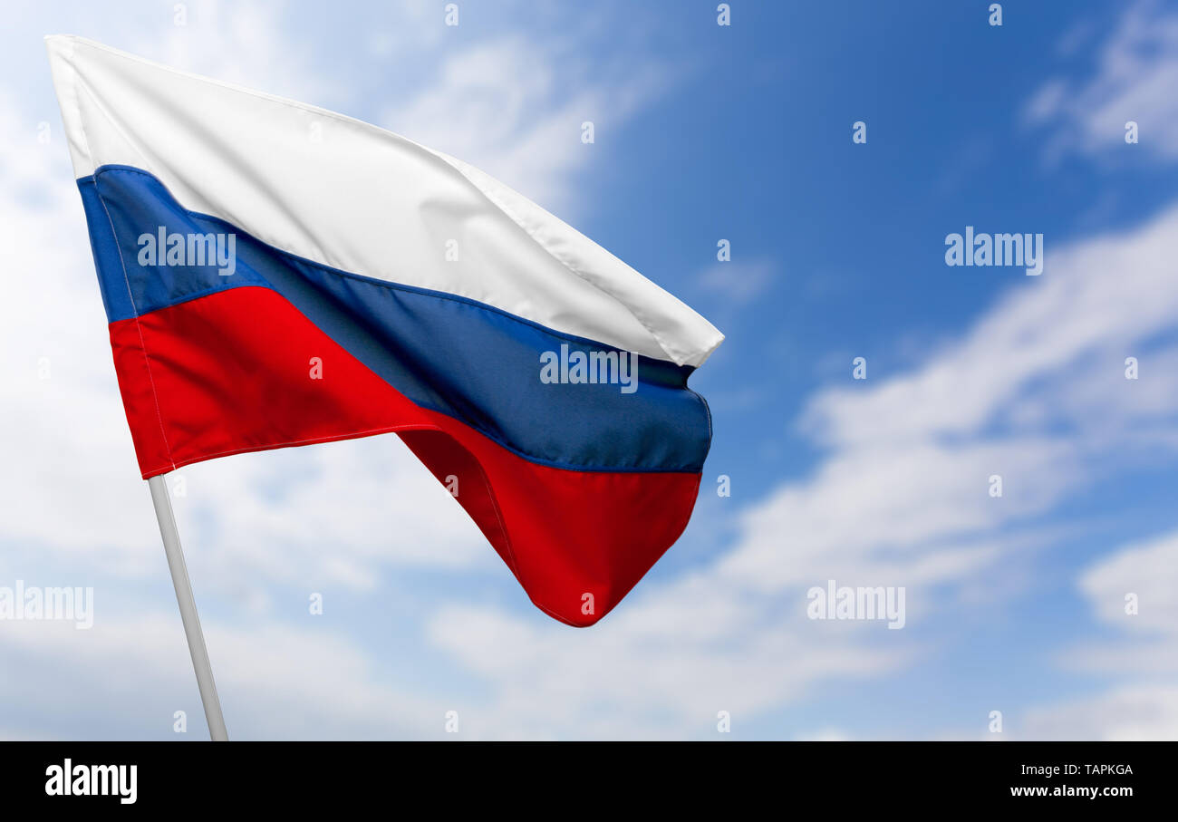 Russian flag against blue sky Stock Photo - Alamy