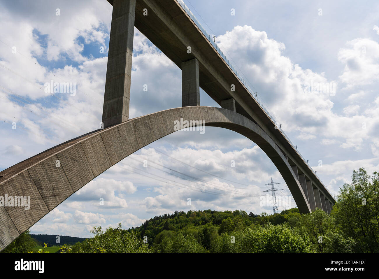 26 May 2019, Bavaria, Rödental: Clouds are moving over the valley ...