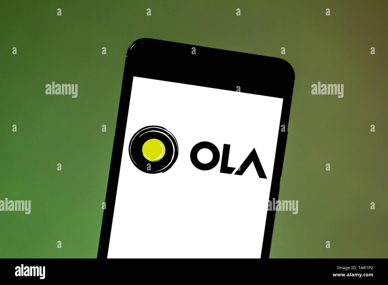 Brazil. 24th May, 2019. In this photo illustration the Ola Cabs logo is ...