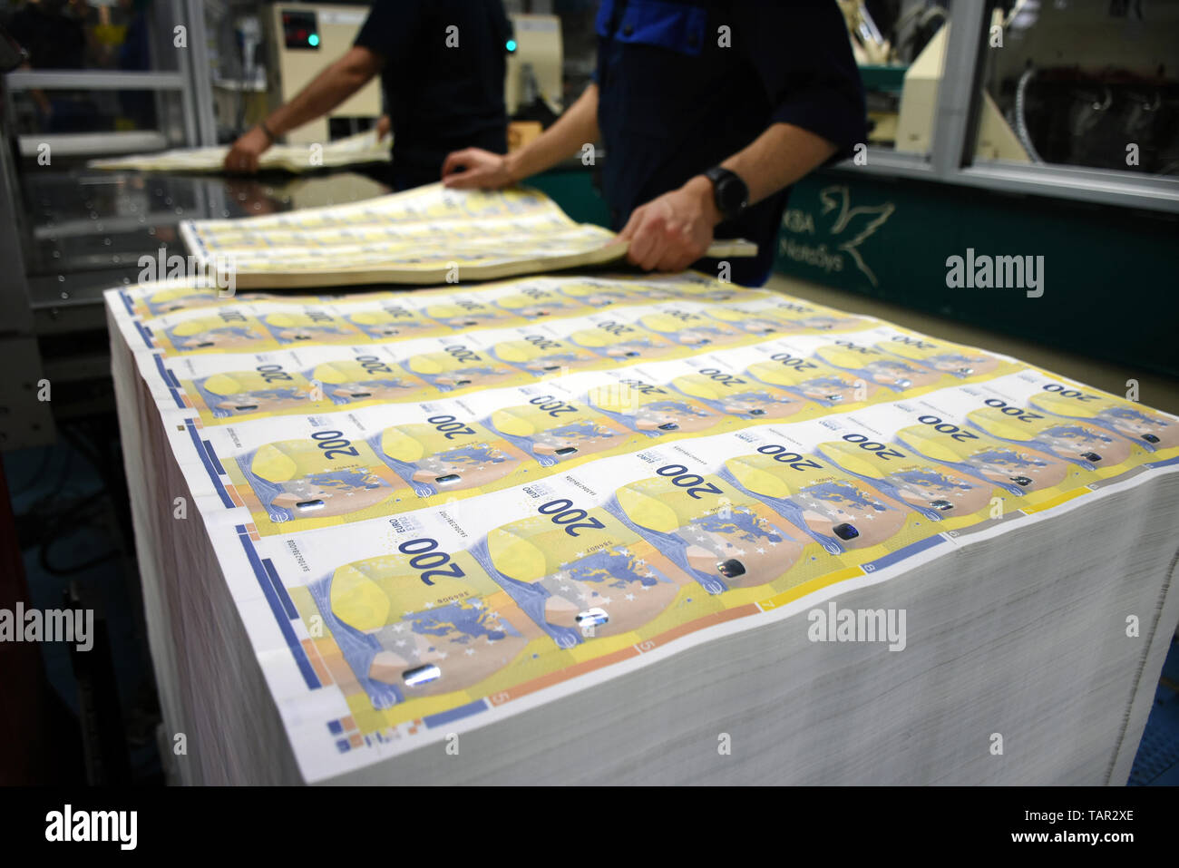 Rom, Italy. 20th May, 2019. Workers sort printed sheets for the ...