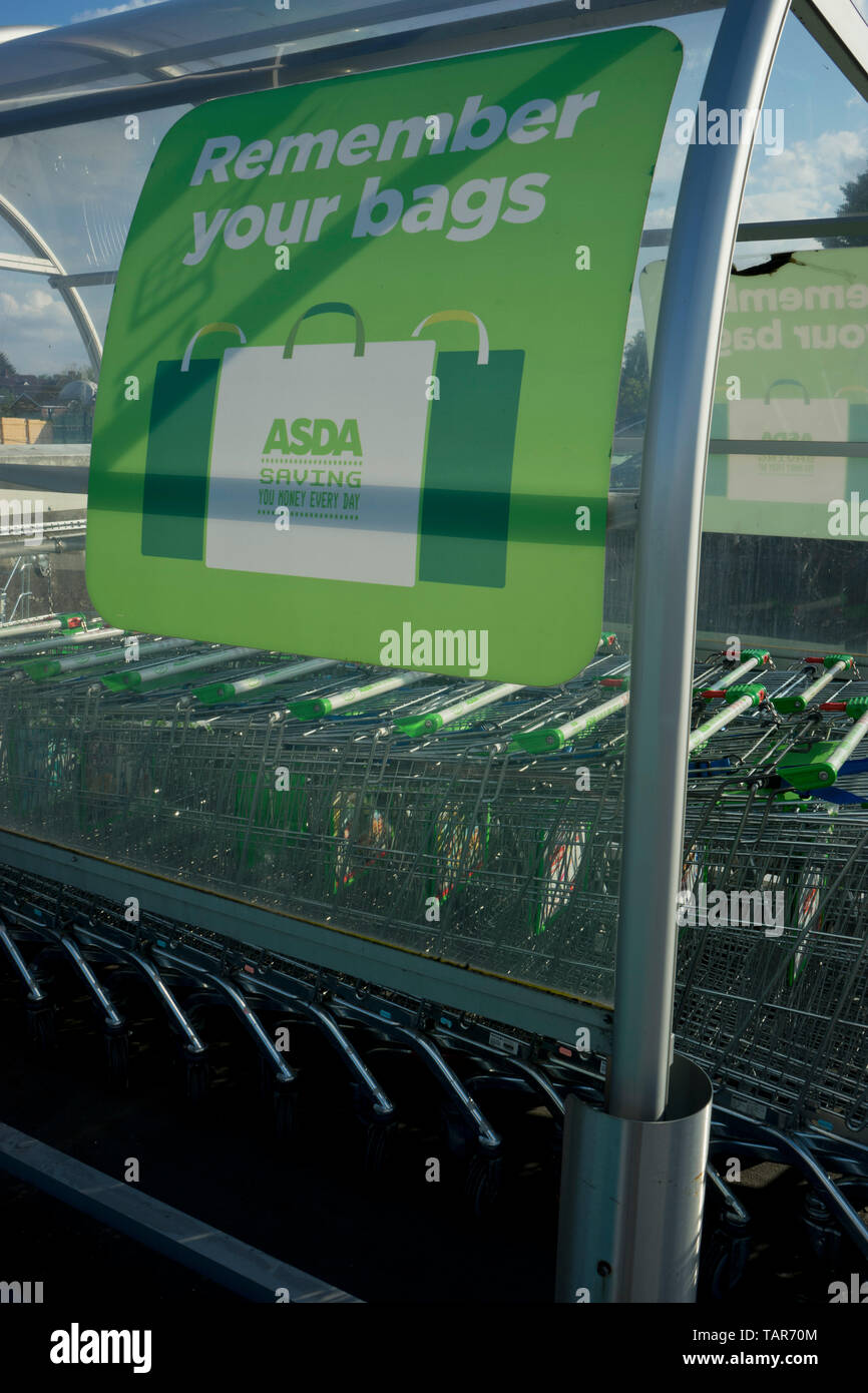 Shopping trolley stand at car park at Asda supermarket in Colindale ...