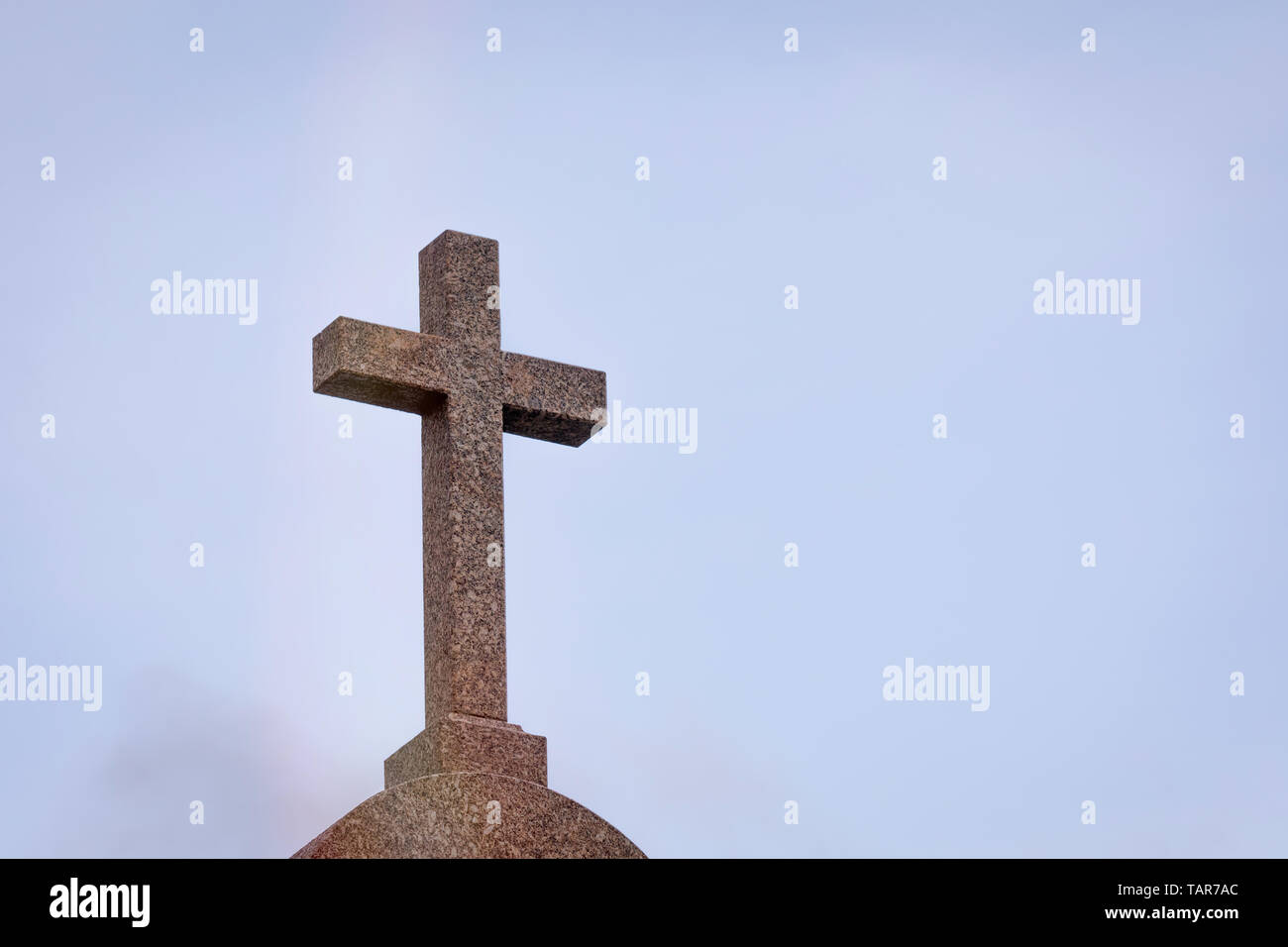 Granite cross on the top of a church Stock Photo - Alamy
