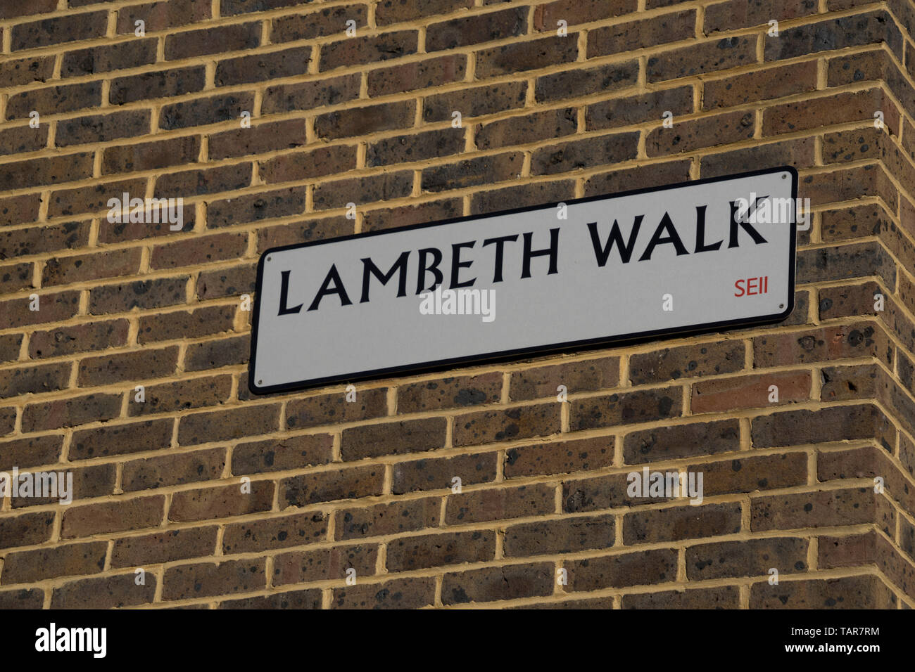 Old council social housing with sign in the famous Lambeth Walk street ...