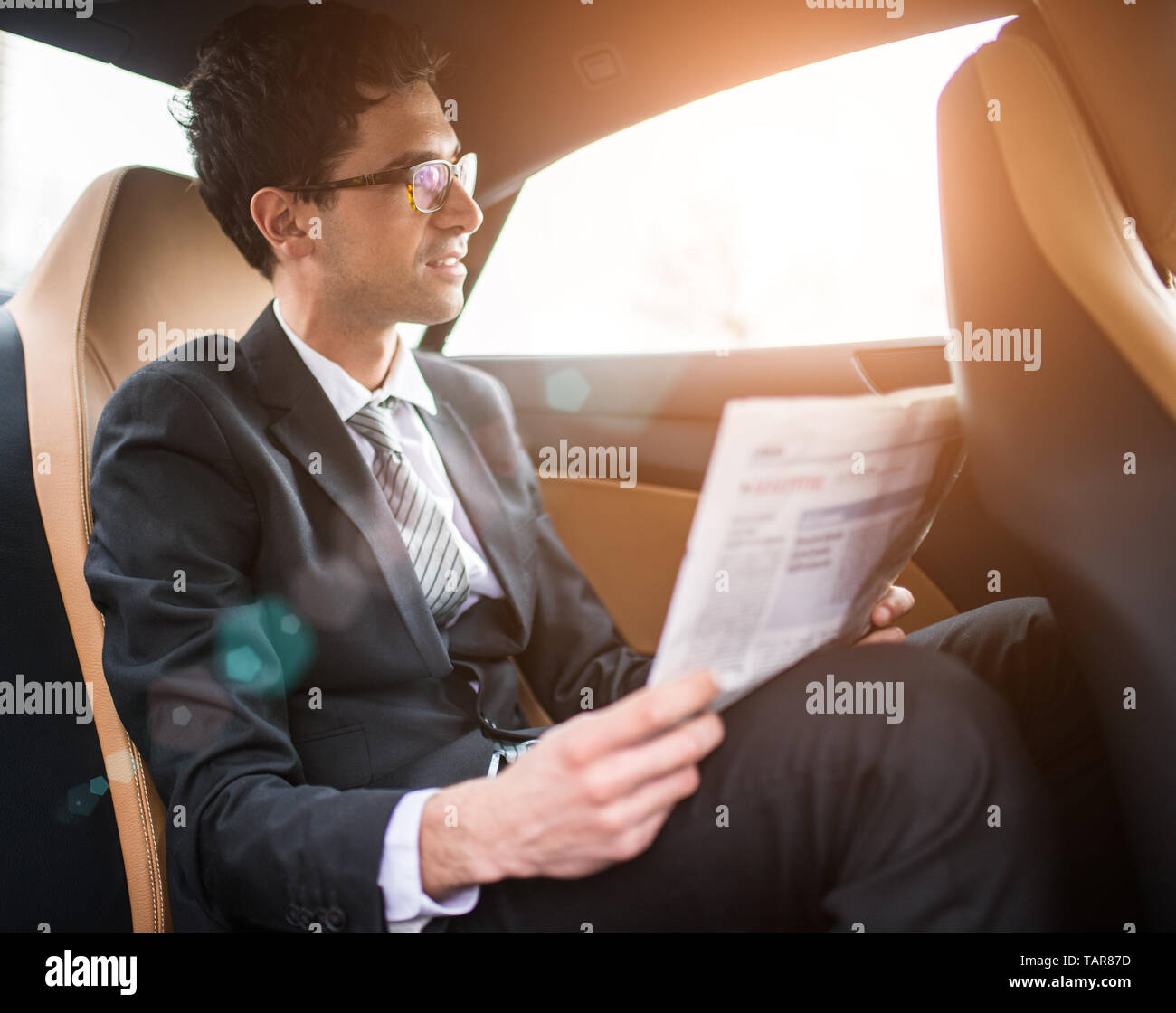 Car newspaper hi-res stock photography and images - Alamy