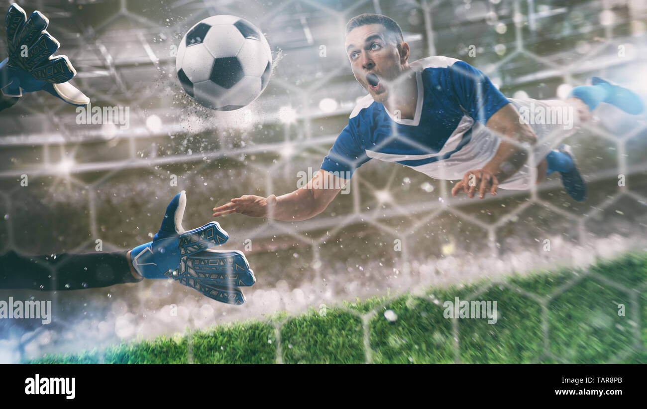 Goalkeeper catches the ball in the stadium during a football game Stock ...