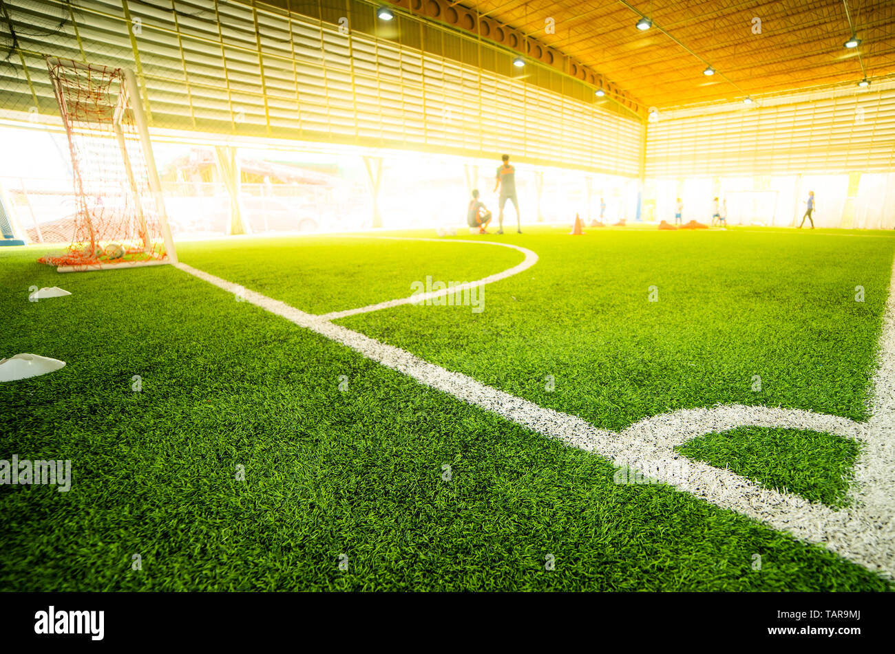 Corner kick spot in an indoor soccer field Stock Photo - Alamy