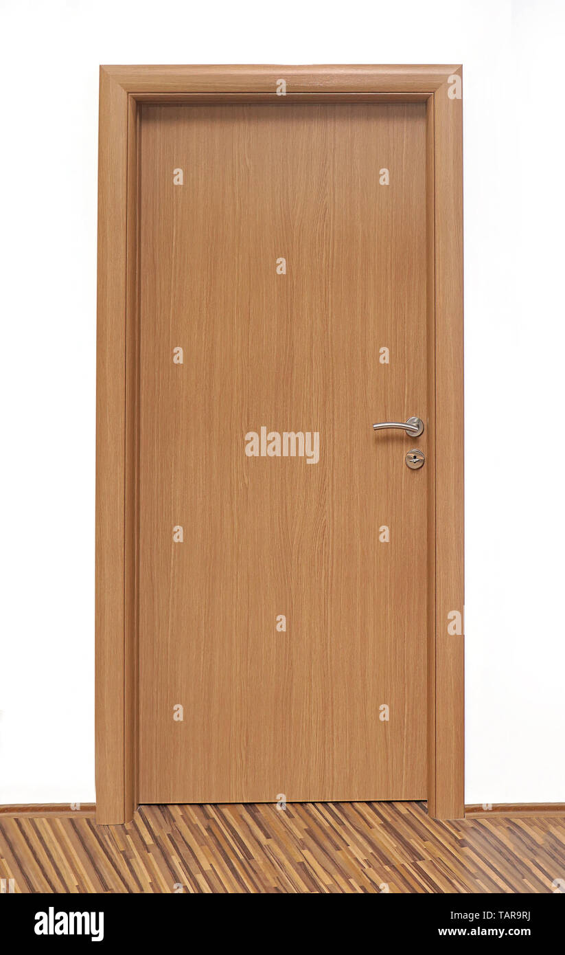 Closed interior brown wooden door with wood parquet floor Stock Photo ...